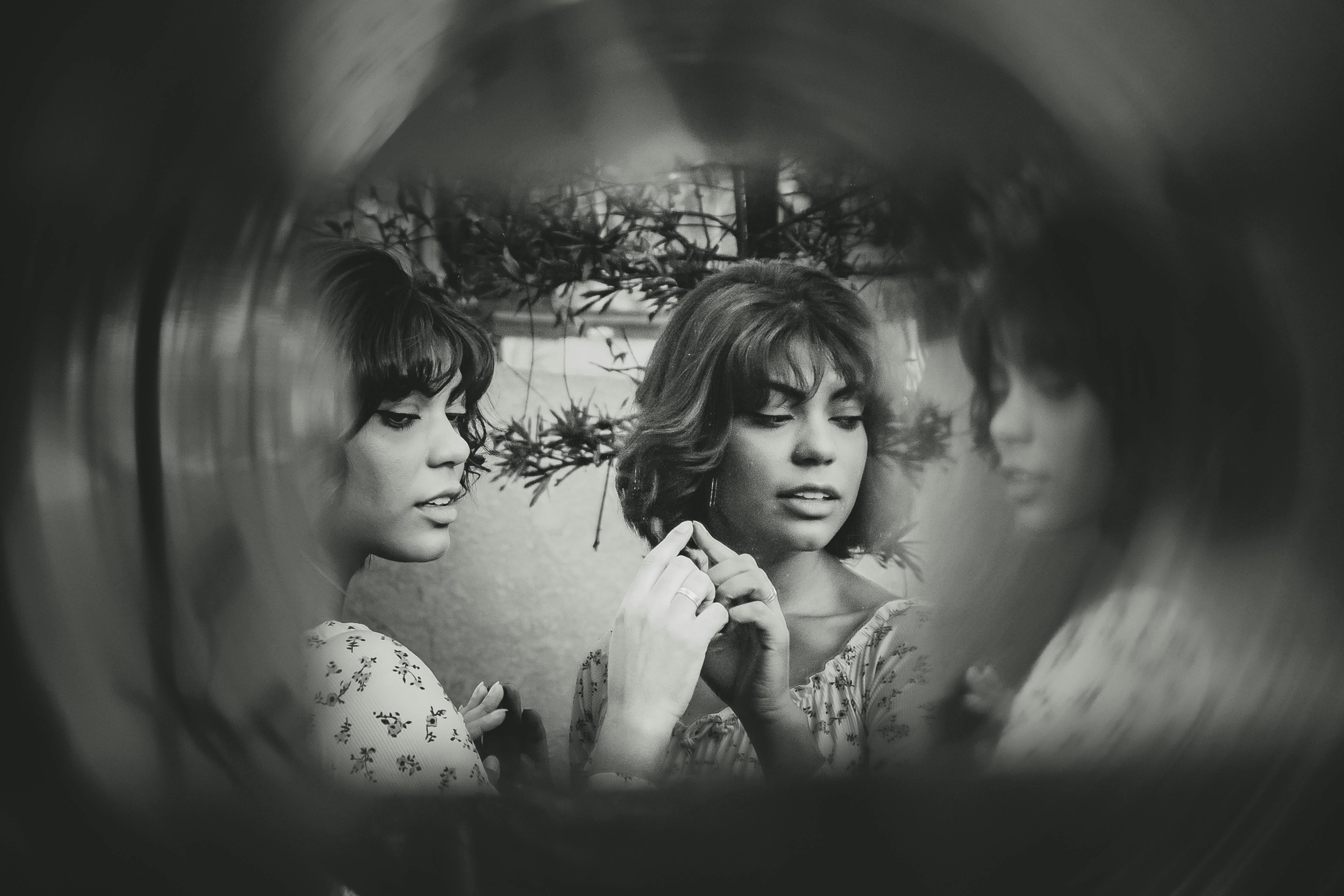 Brunette Woman Posing with White Snake in Hand · Free Stock Photo