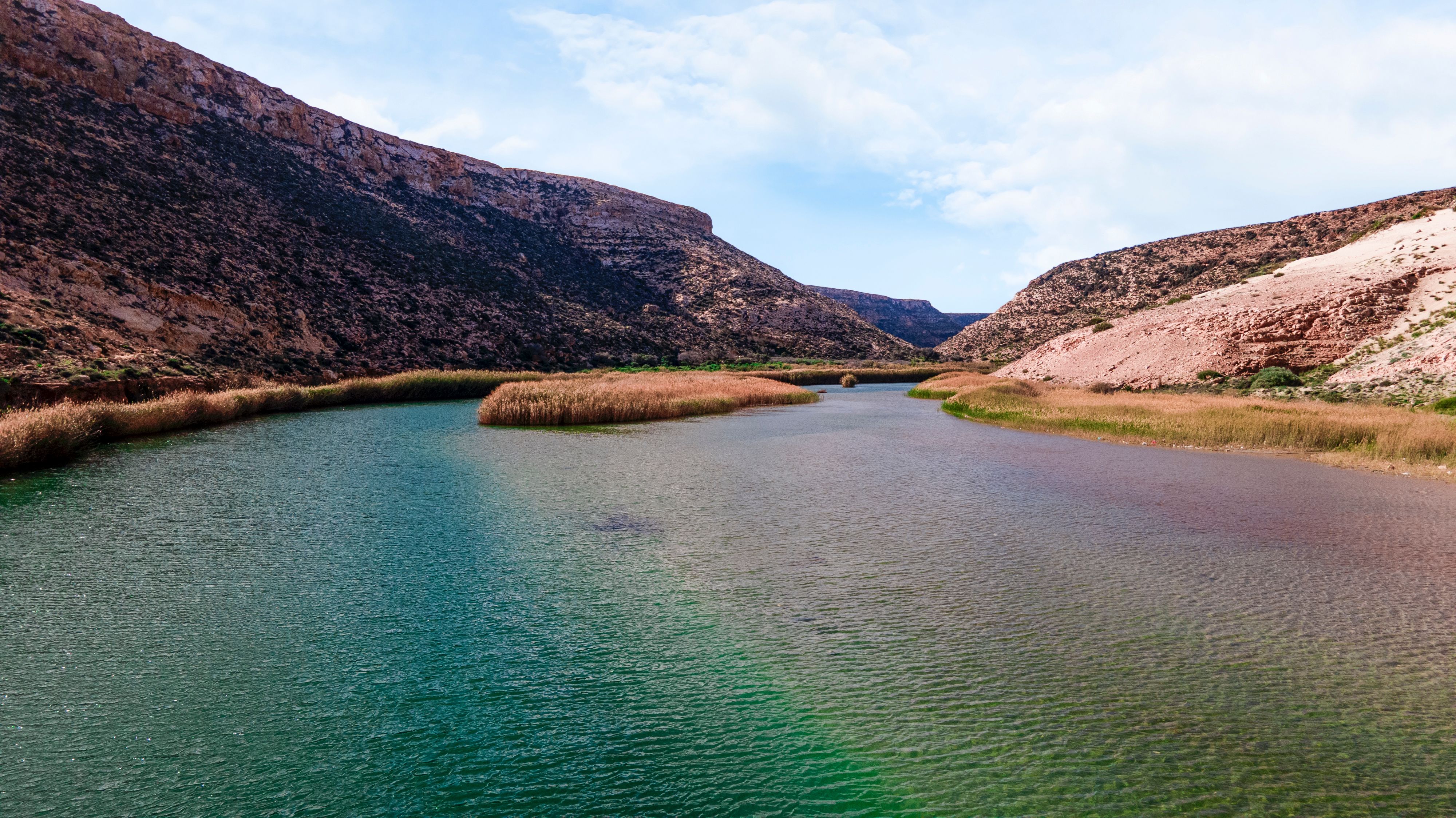 Lake between Mountains · Free Stock Photo