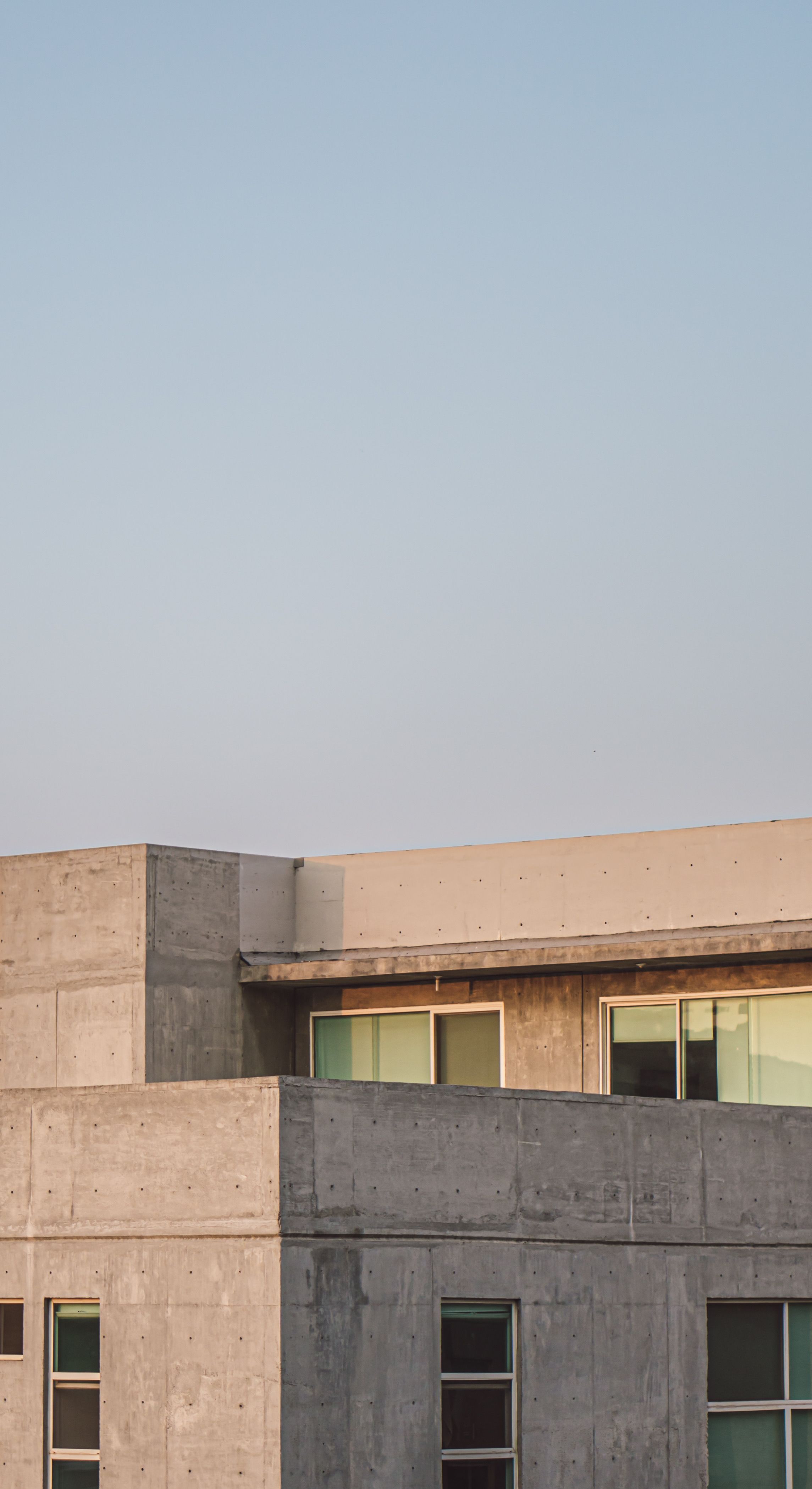 Concrete Wall of Building with Geometrical Designs · Free Stock Photo