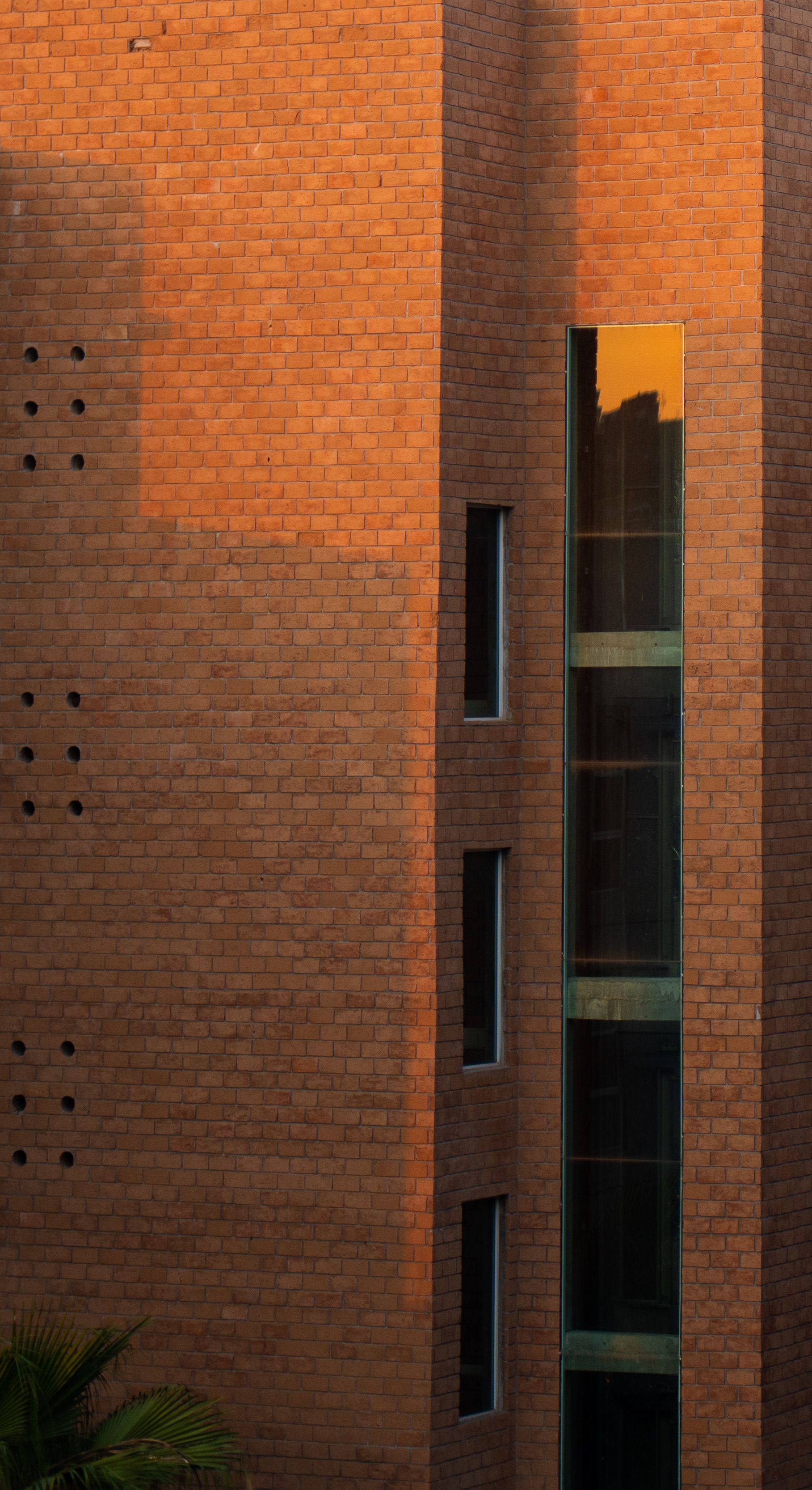 Brown Brick Building Near the Green Trees · Free Stock Photo