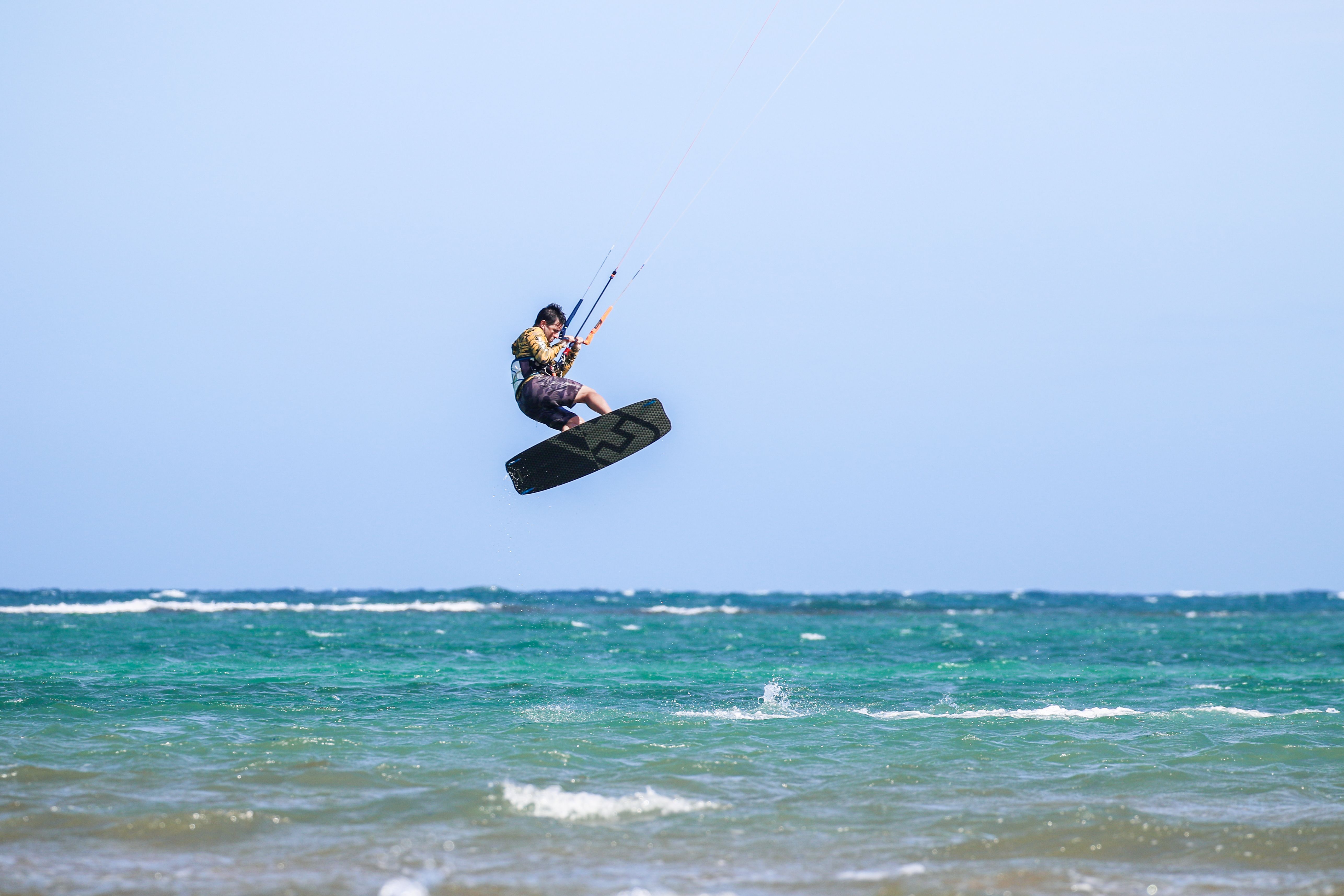 People Jumping to Water in Town · Free Stock Photo