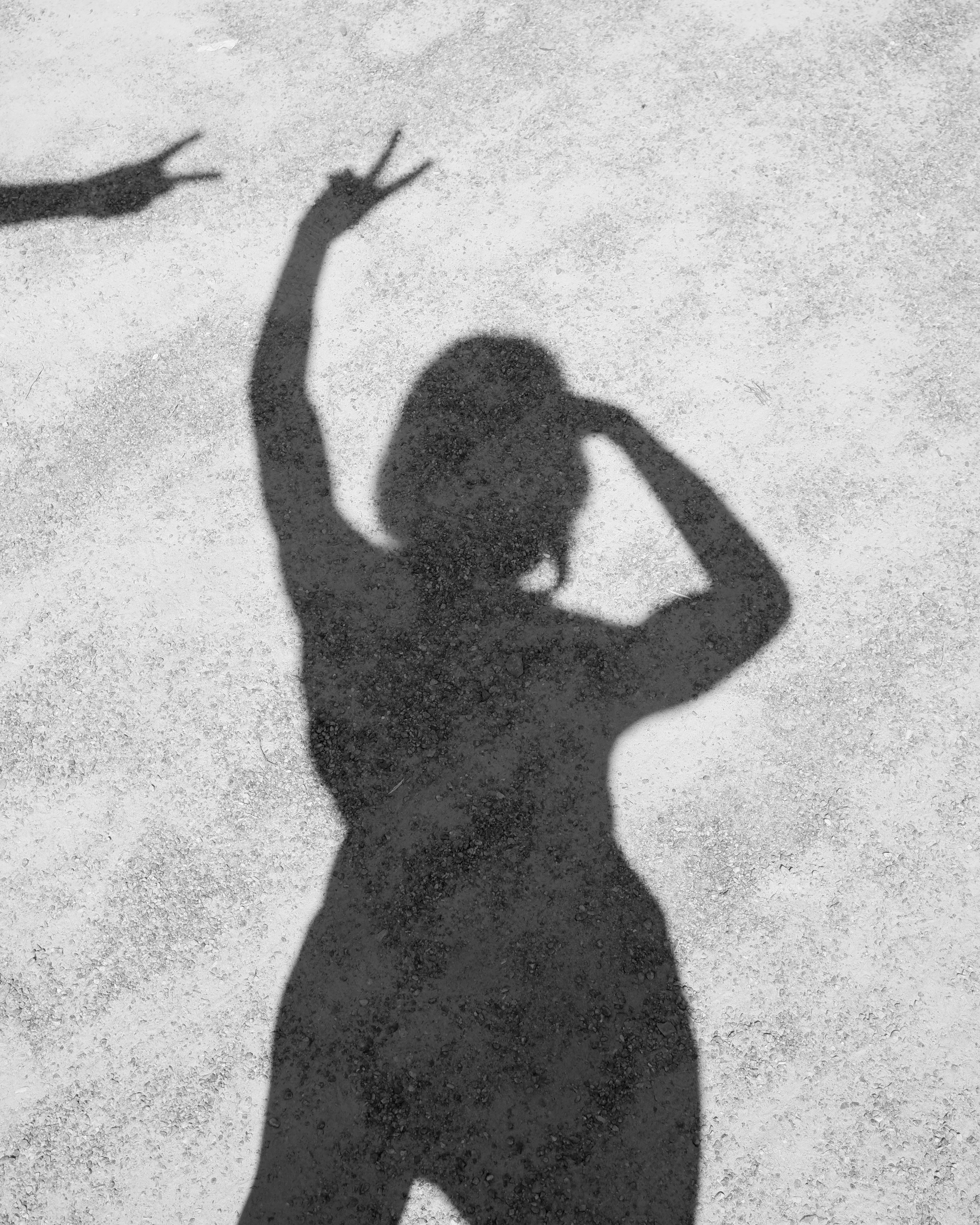 Shadow of People Raising Their Hands · Free Stock Photo