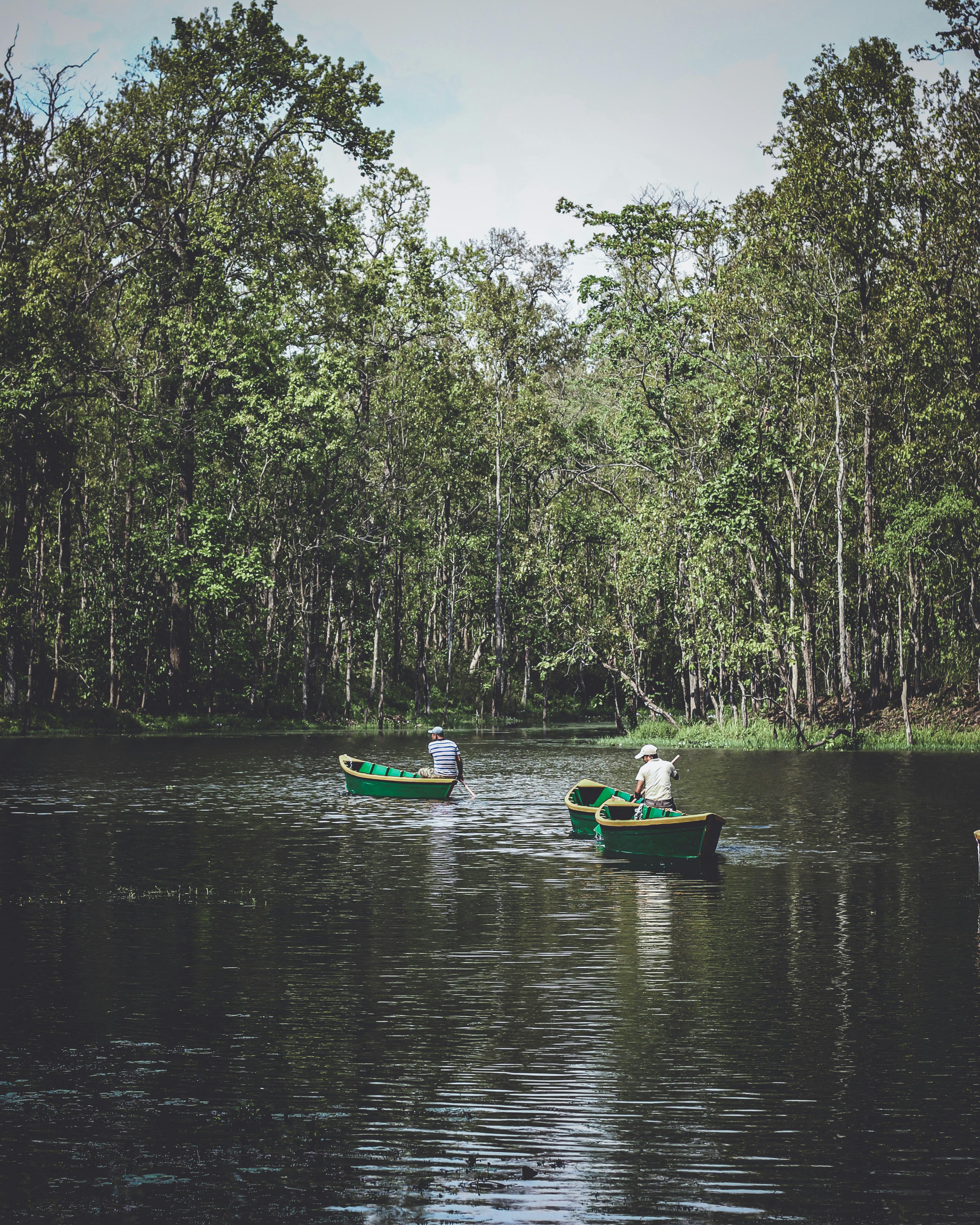 People Riding Boats on the River · Free Stock Photo
