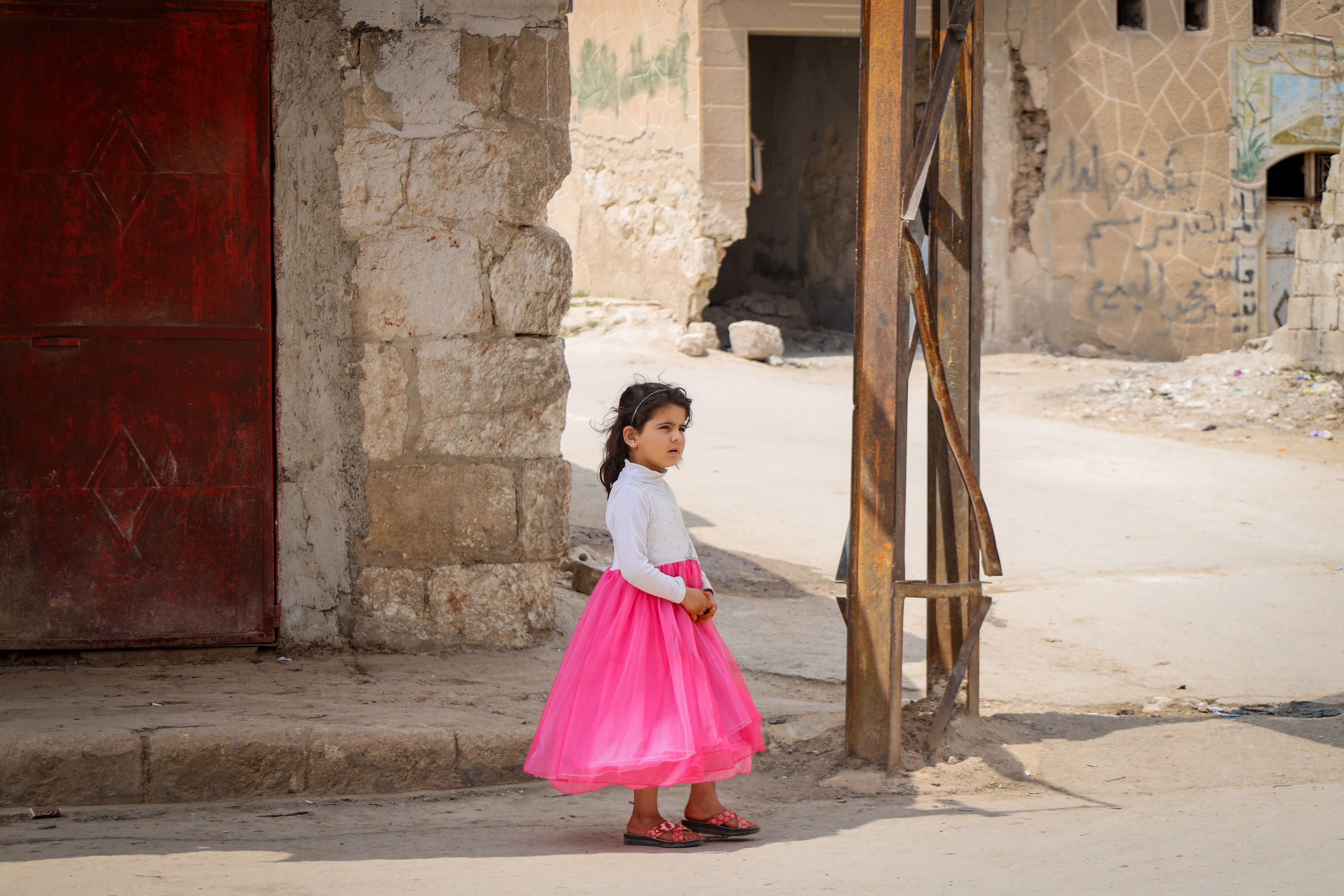 Girl in White and Pink Dress Standing on Concrete Floor · Free Stock Photo