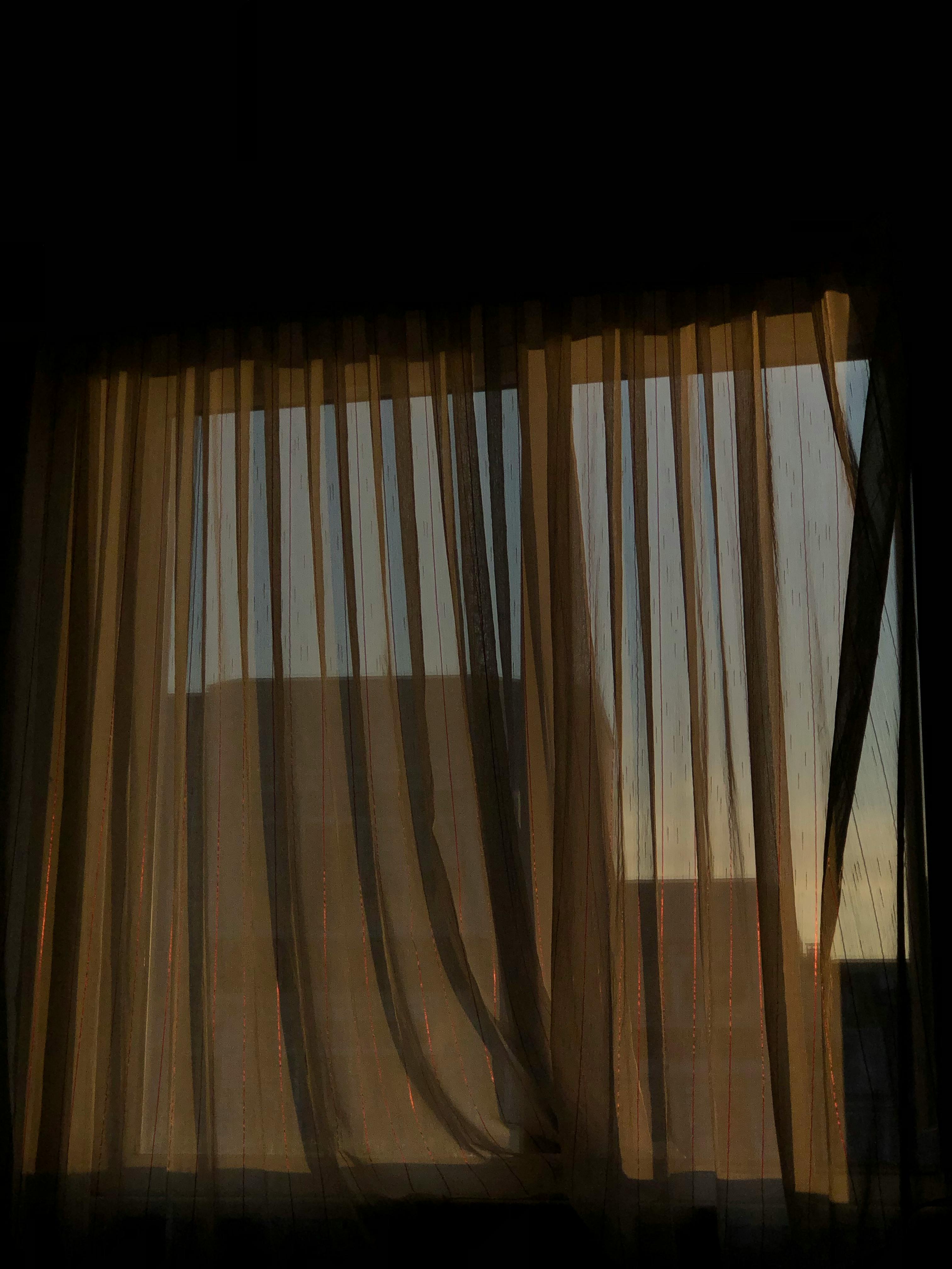 See Through Curtains on a Window · Free Stock Photo