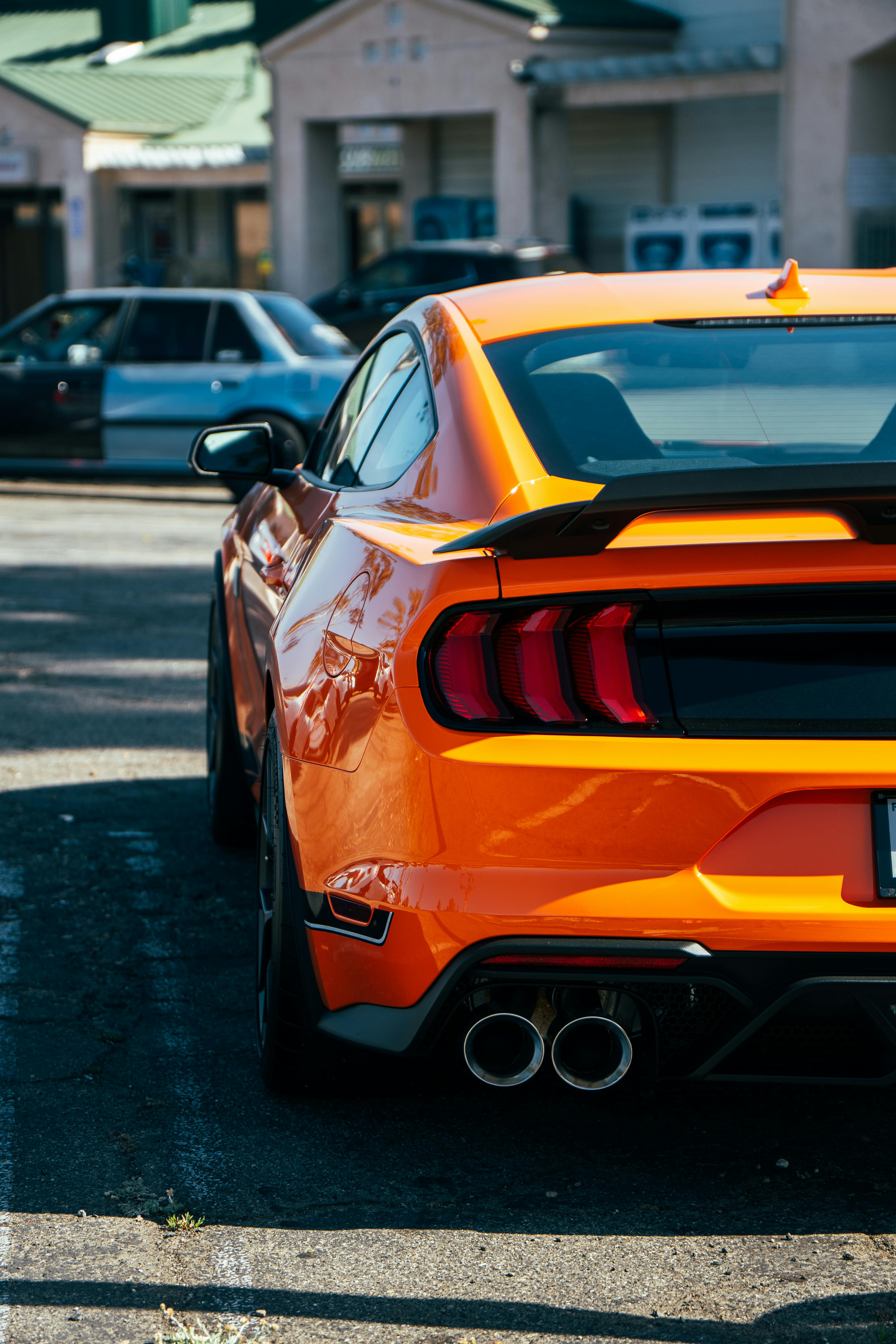 Backlights of a Yellow Mustang Sportscar · Free Stock Photo
