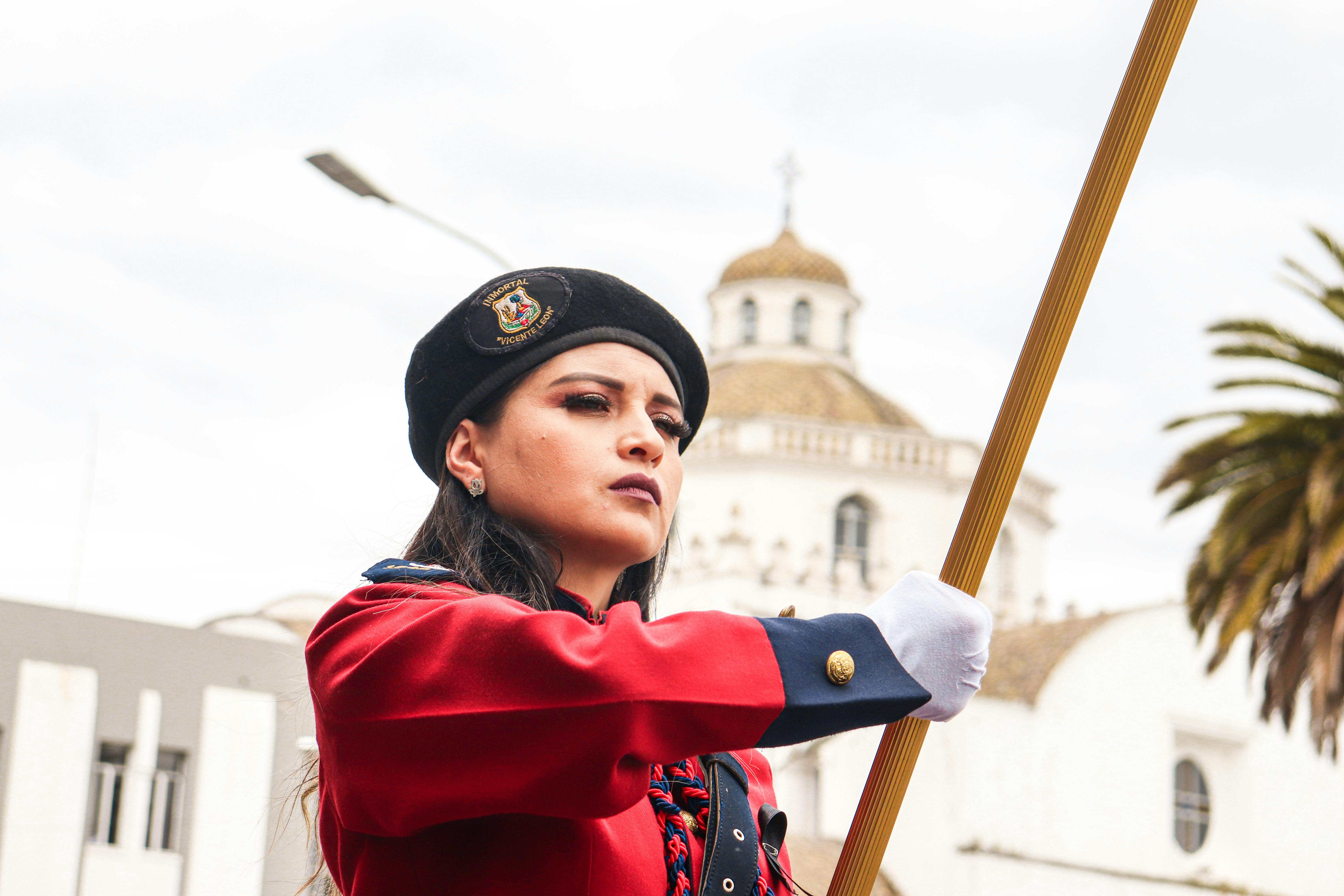 Close-up of a Woman Holding a Flag · Free Stock Photo