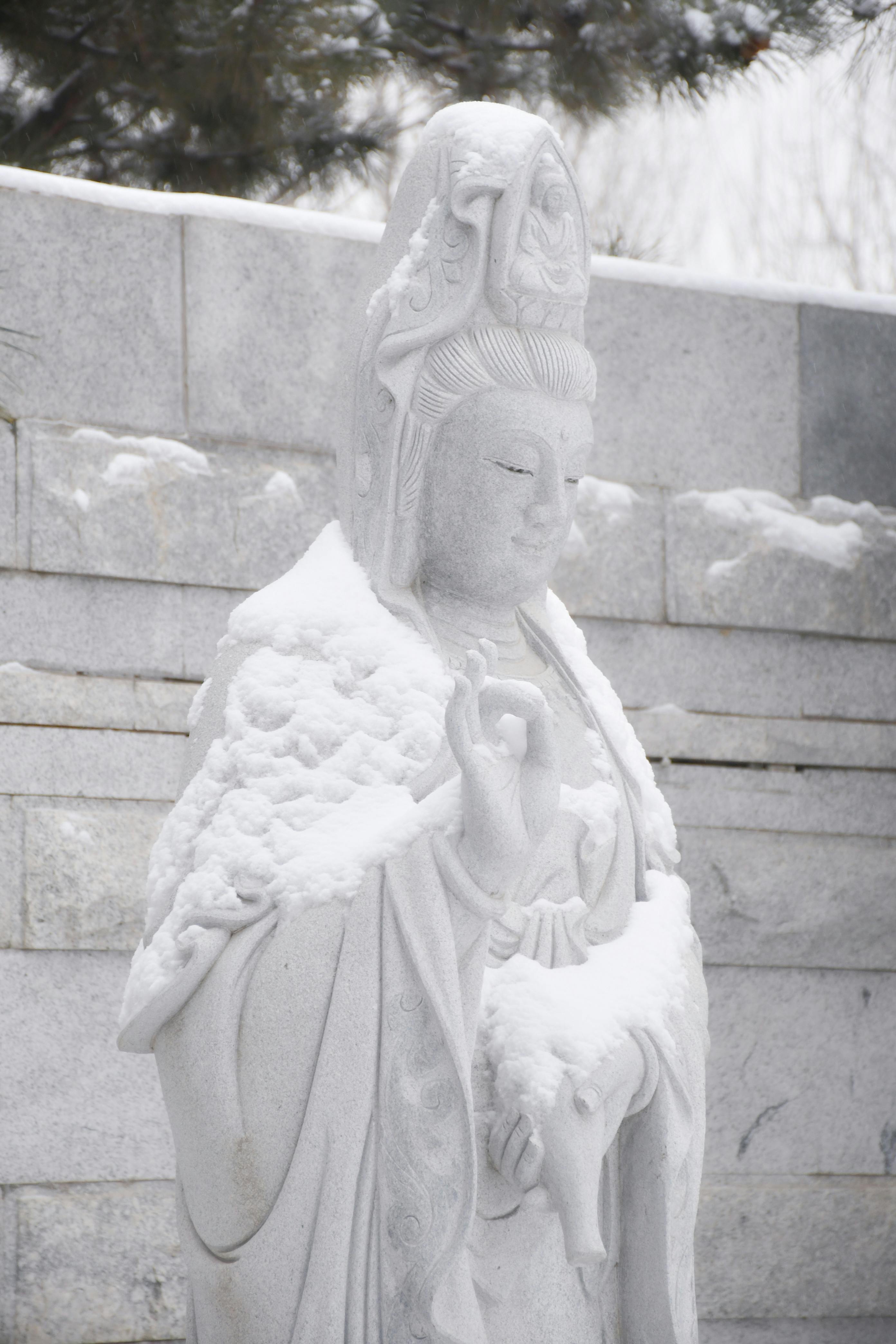 White Statue in Close Up Shot · Free Stock Photo