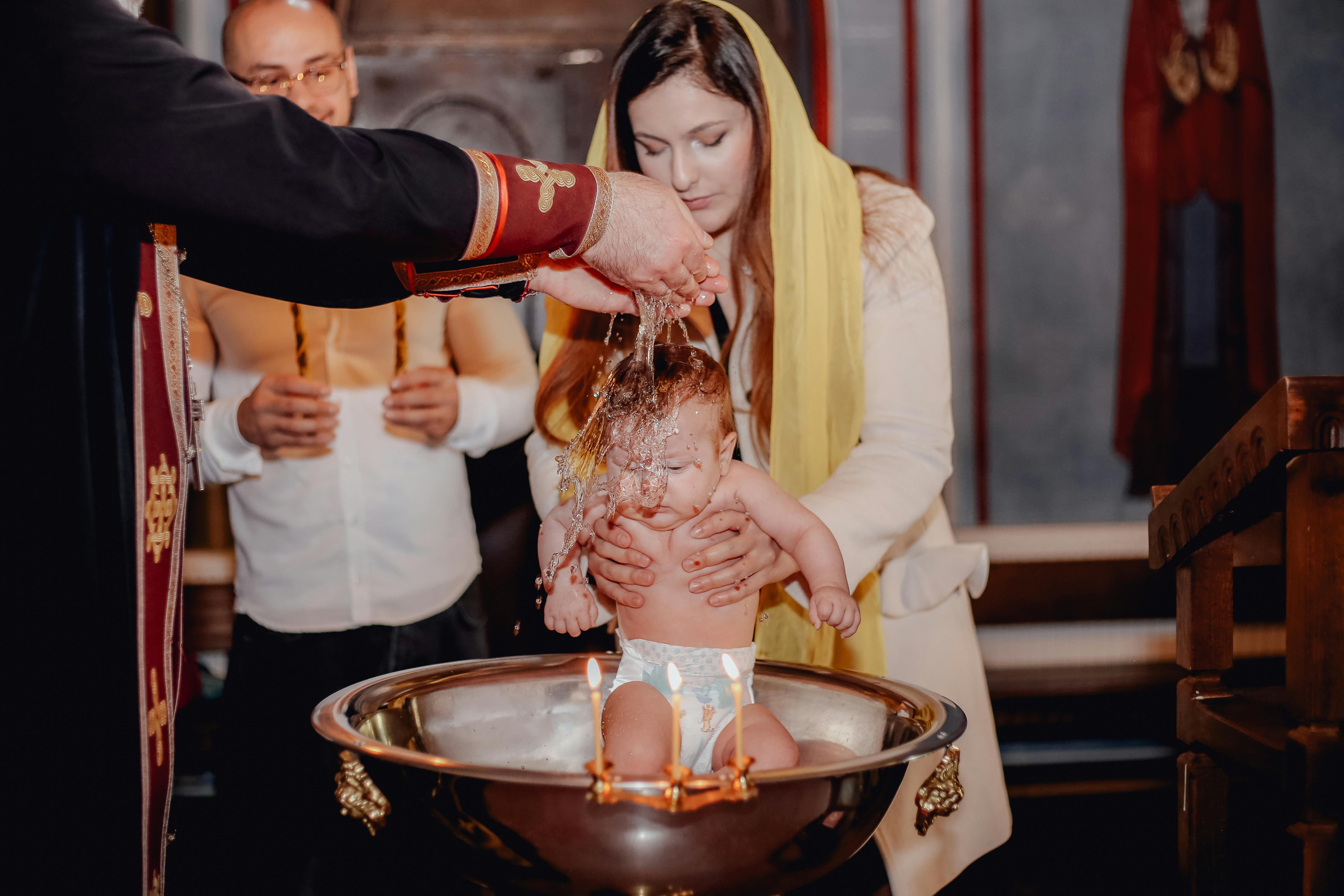 A Baby Being Baptized · Free Stock Photo