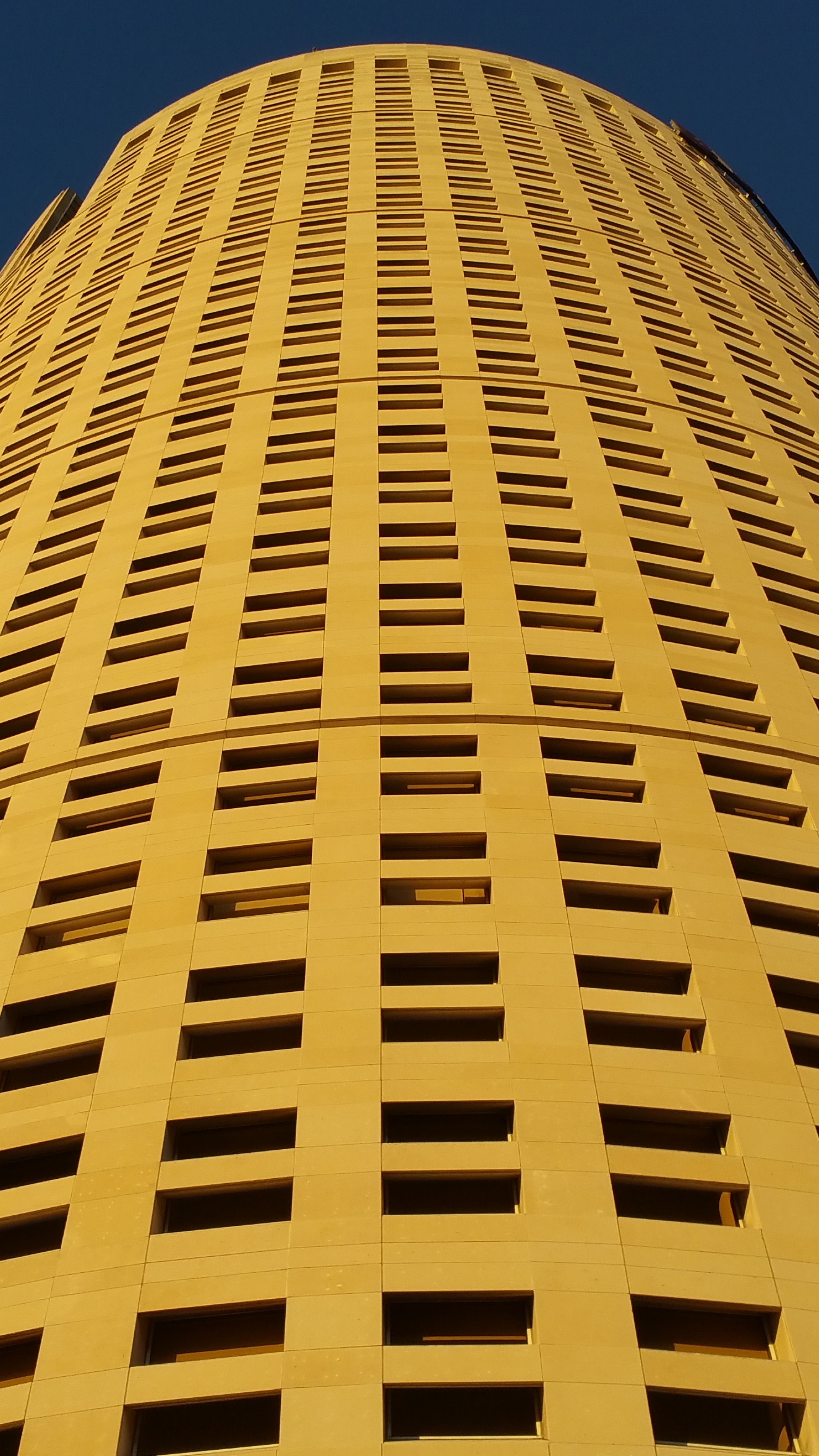 Low-angle Photography of Gray Spiral Building · Free Stock Photo
