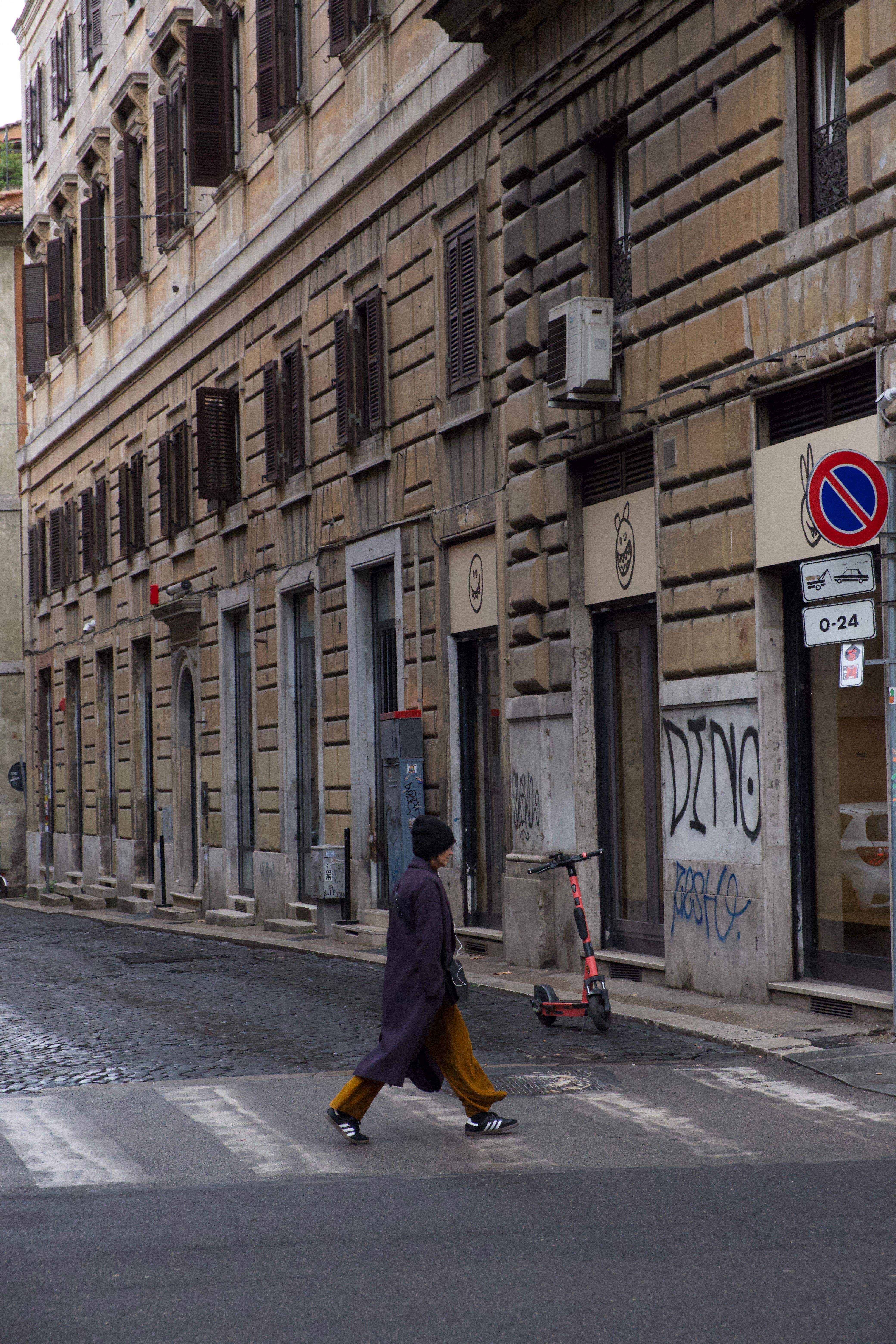 Person Crossing Empty Street · Free Stock Photo