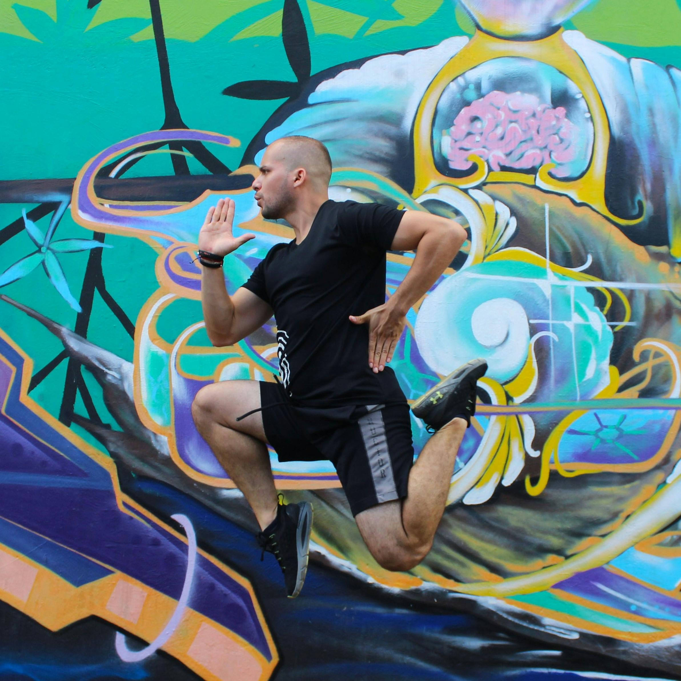 Flying Knee Kick Pose · Free Stock Photo