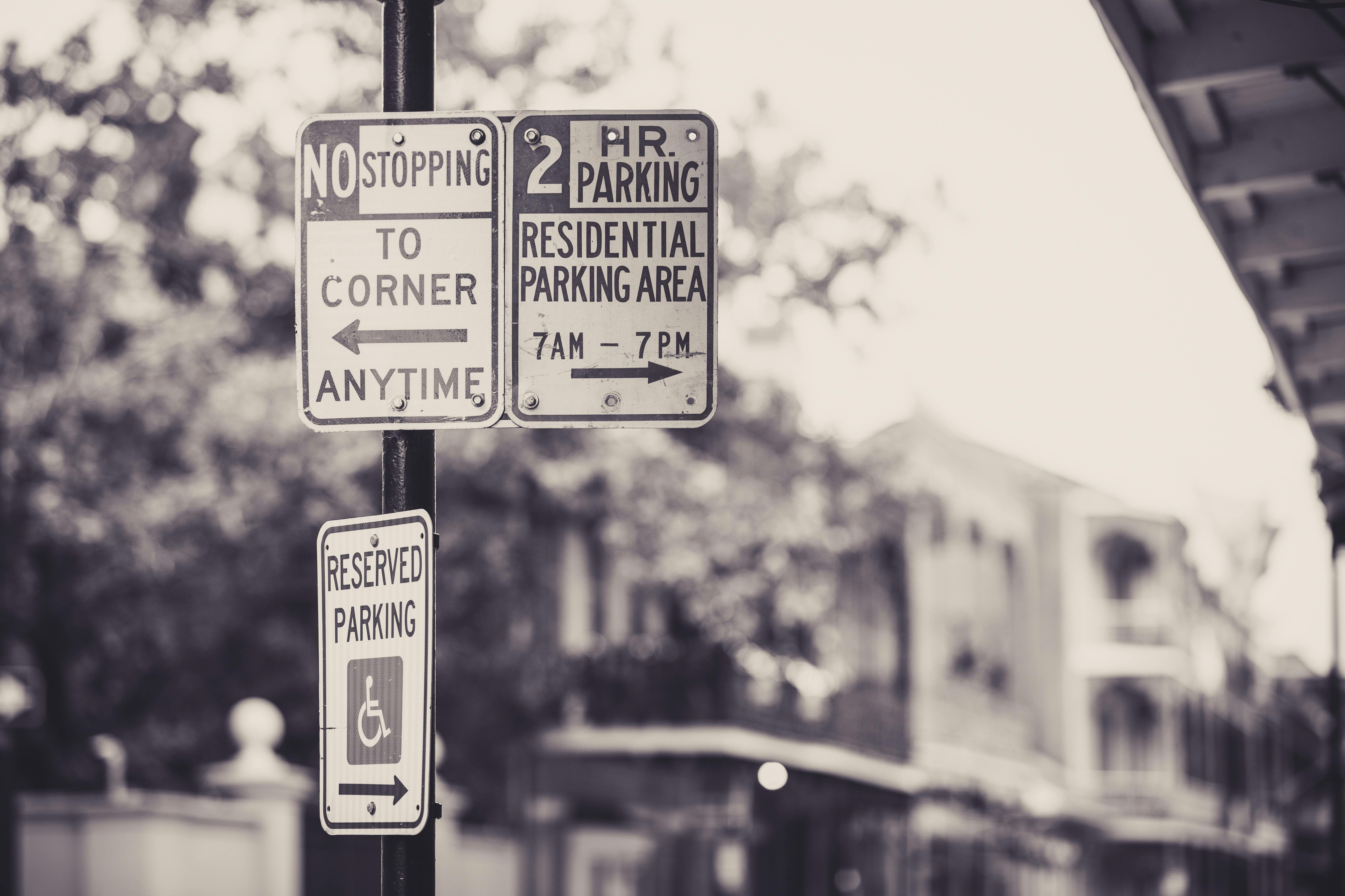 Parking Information Signs in Black and White · Free Stock Photo