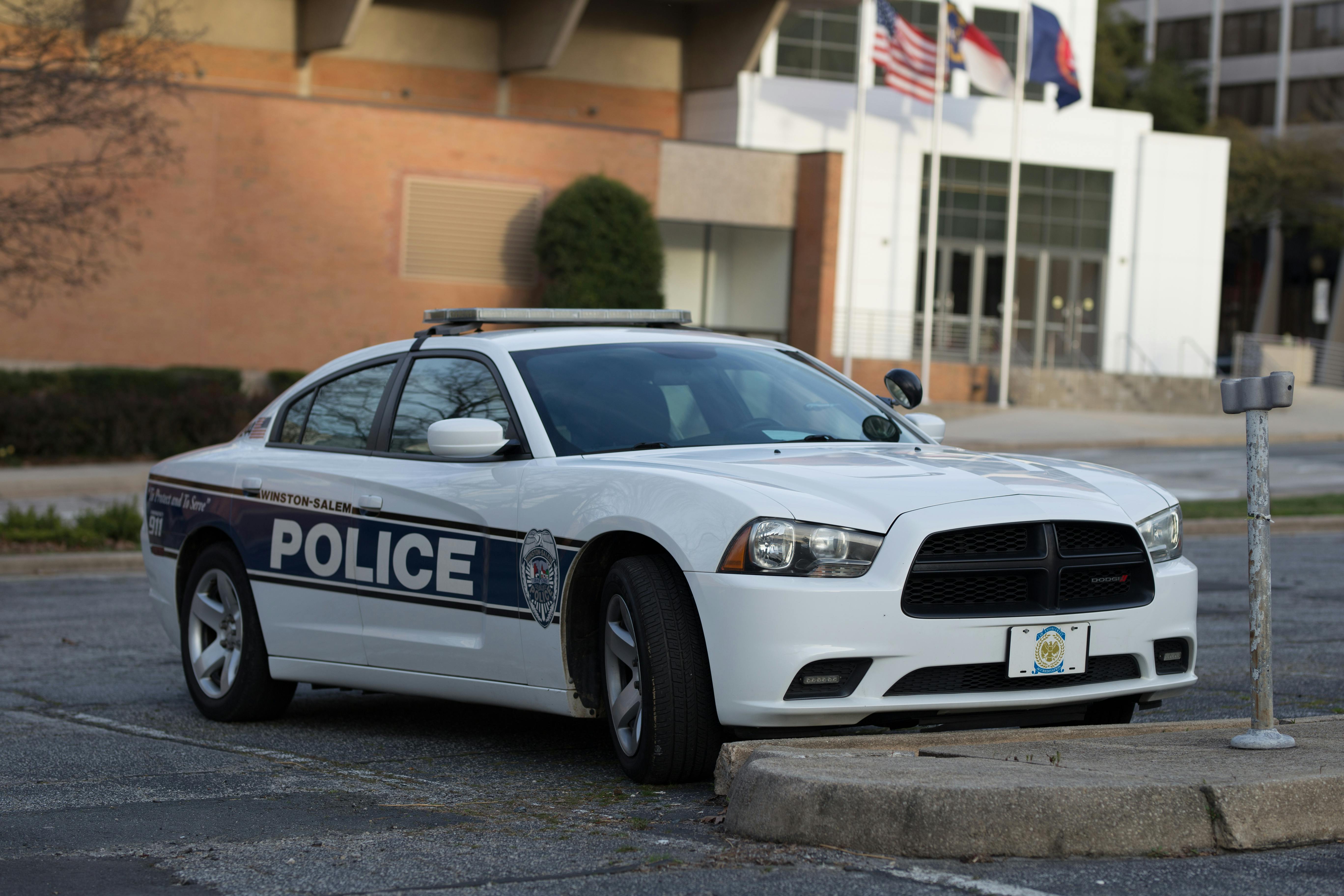 Blue Sports Car Parked on Green Grass · Free Stock Photo