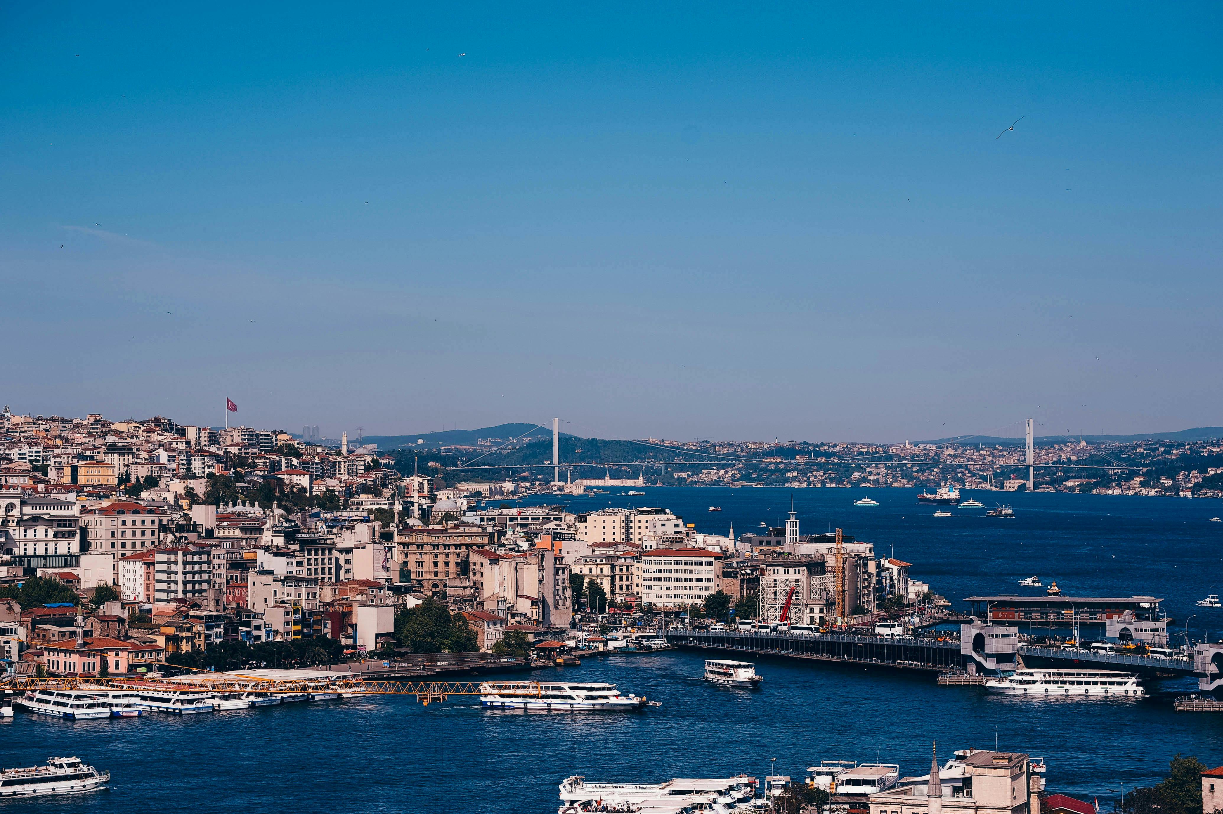 Aerial View of Sea Port Near City Buildings · Free Stock Photo