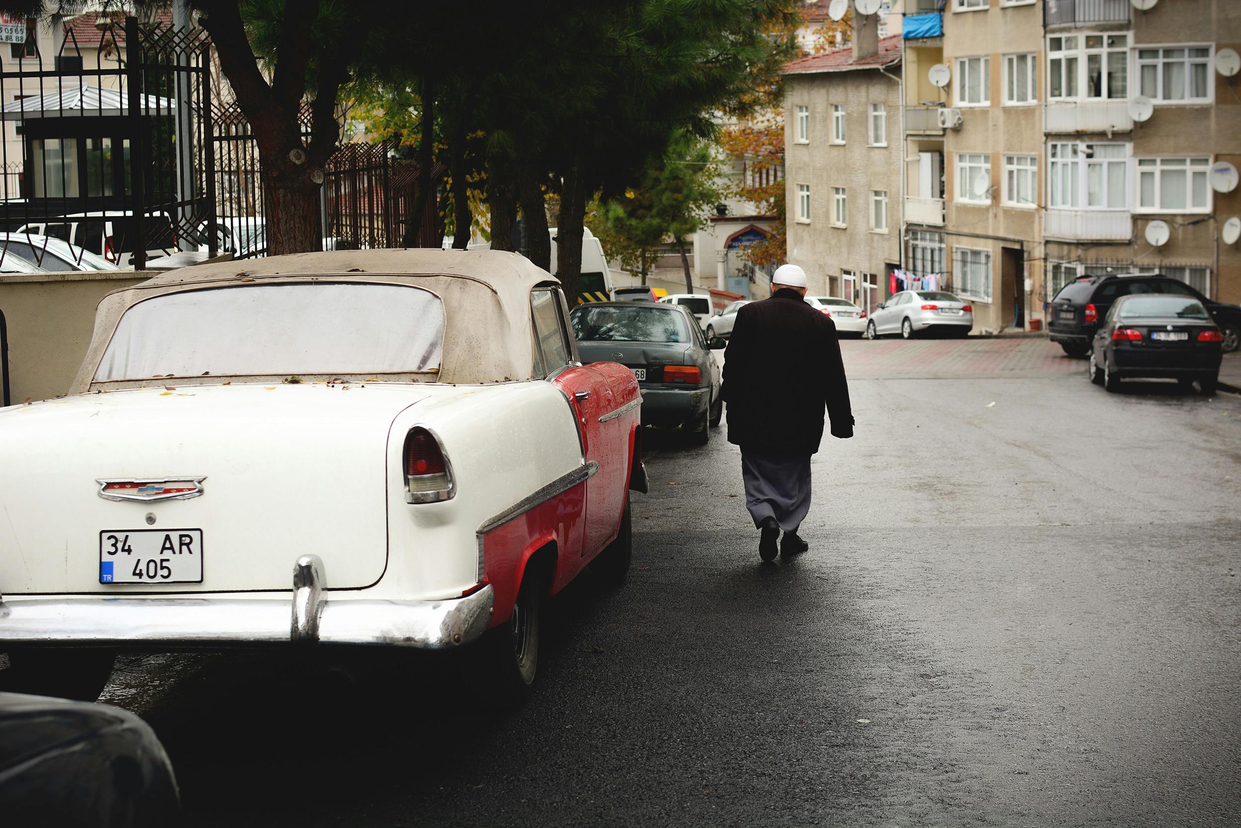 Back View of a Man Standing on the Street in City · Free Stock Photo