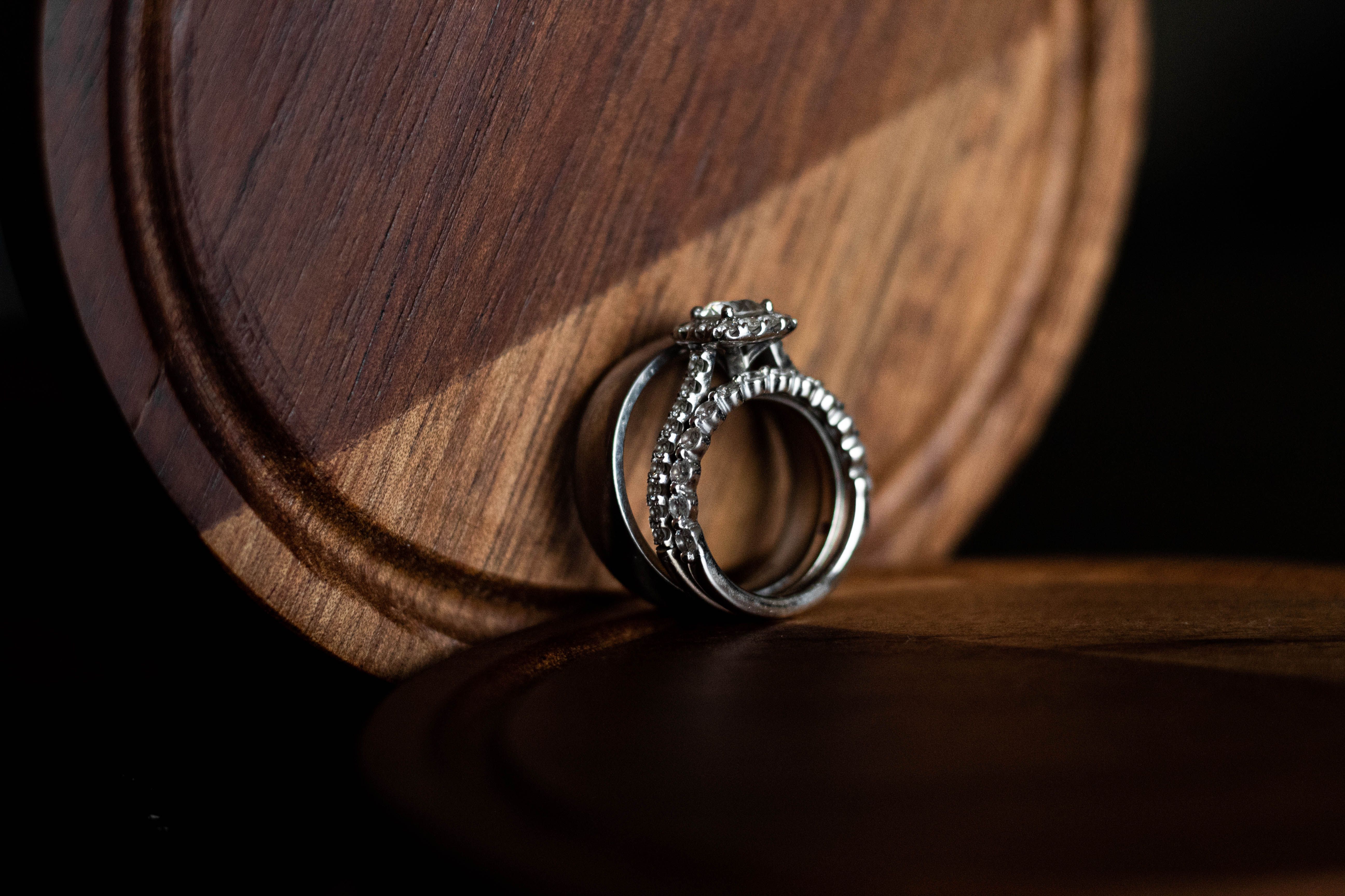 Close-Up Shot of a Silver Wedding Rings · Free Stock Photo