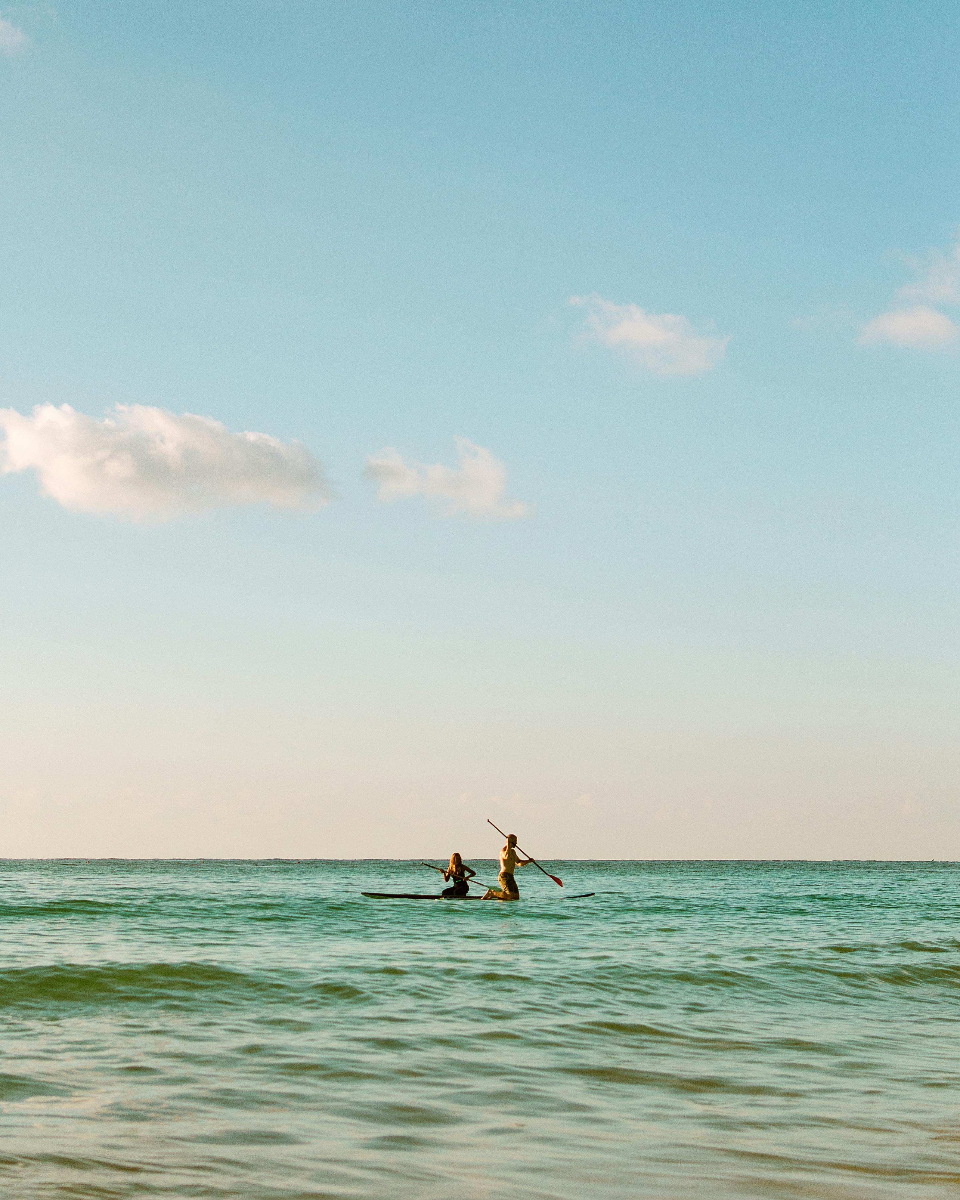 A Woman on a Paddleboard · Free Stock Photo
