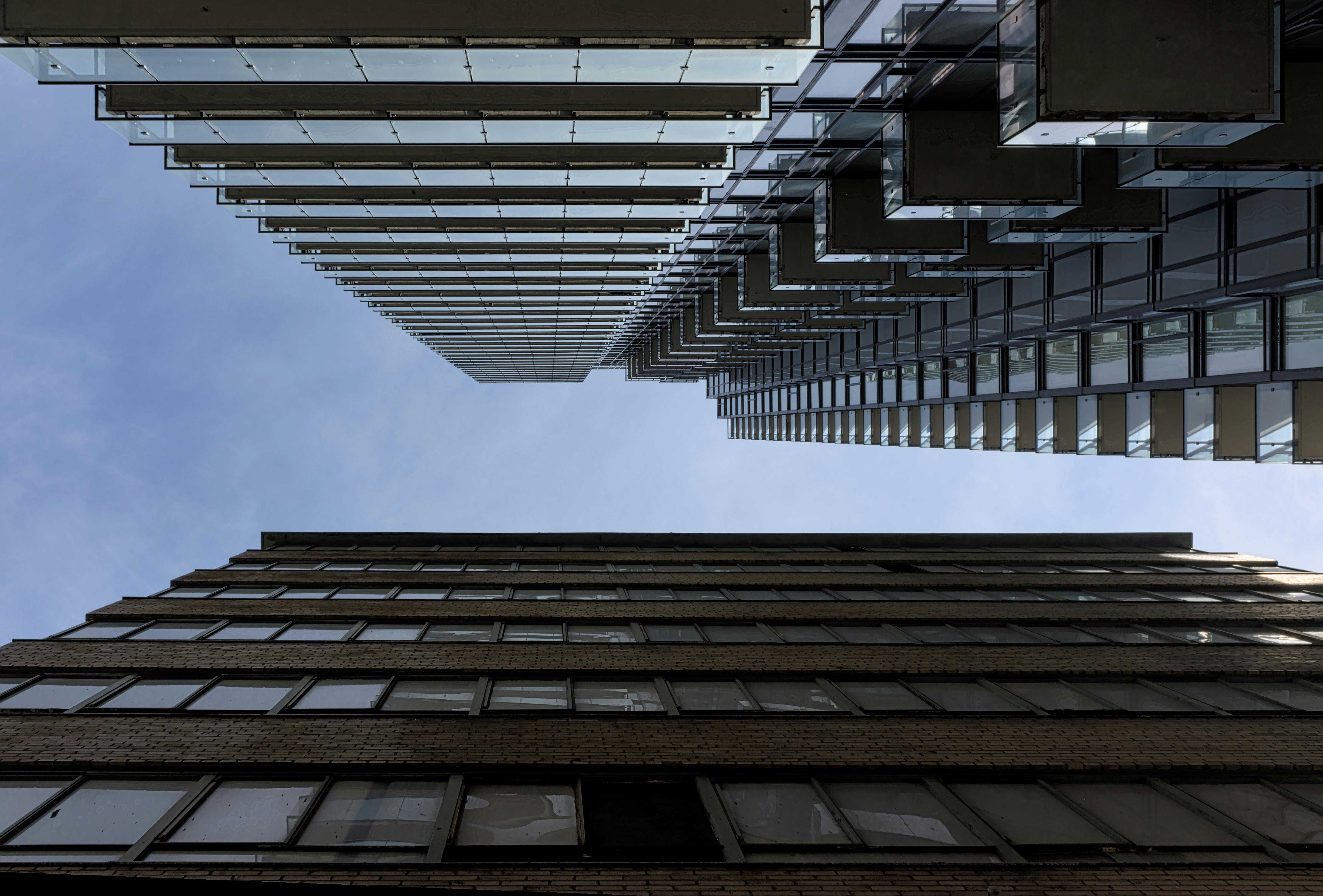 Low Angle Shot of High Rise Buildings · Free Stock Photo