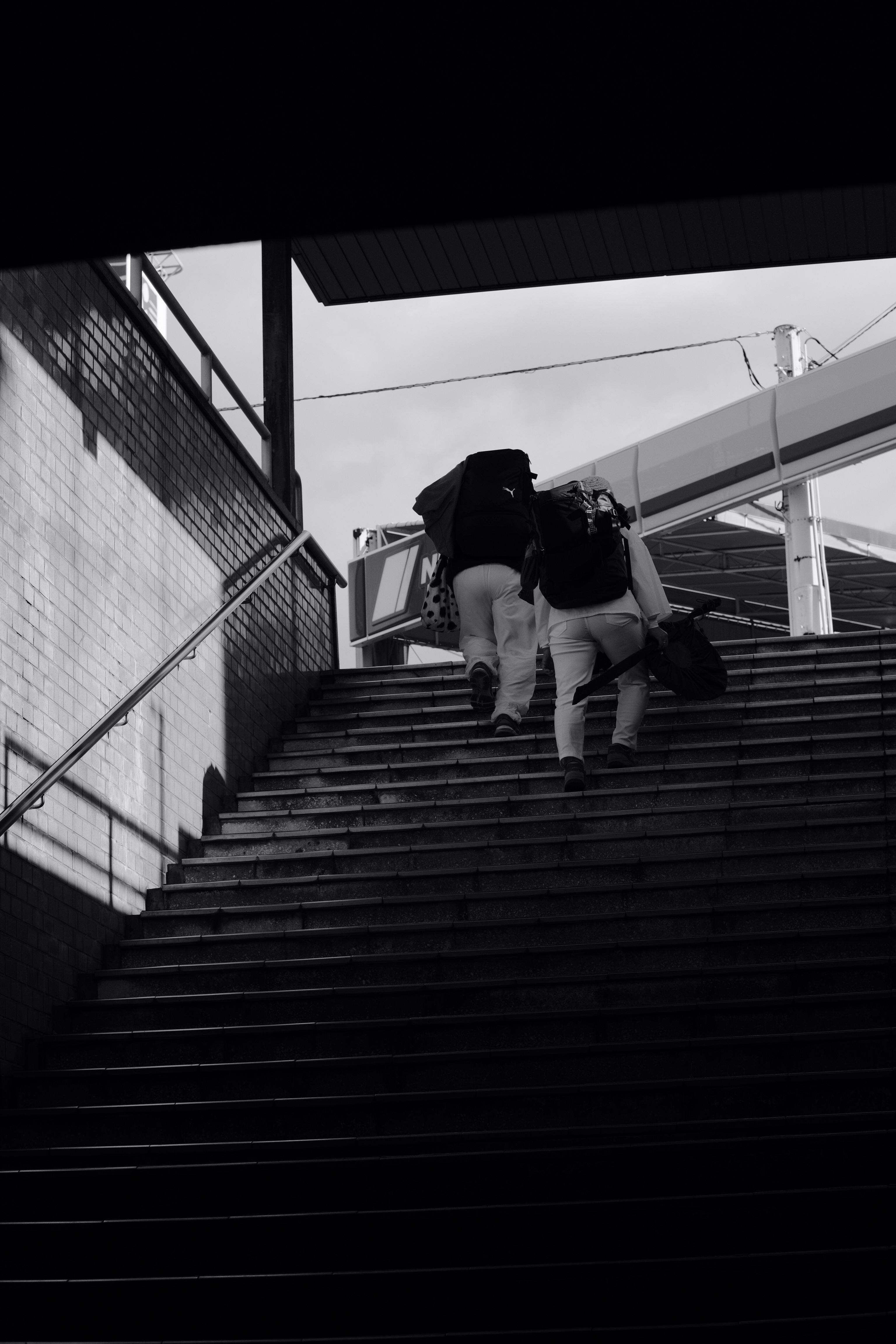 A Person Going Up the Subway Stairs · Free Stock Photo
