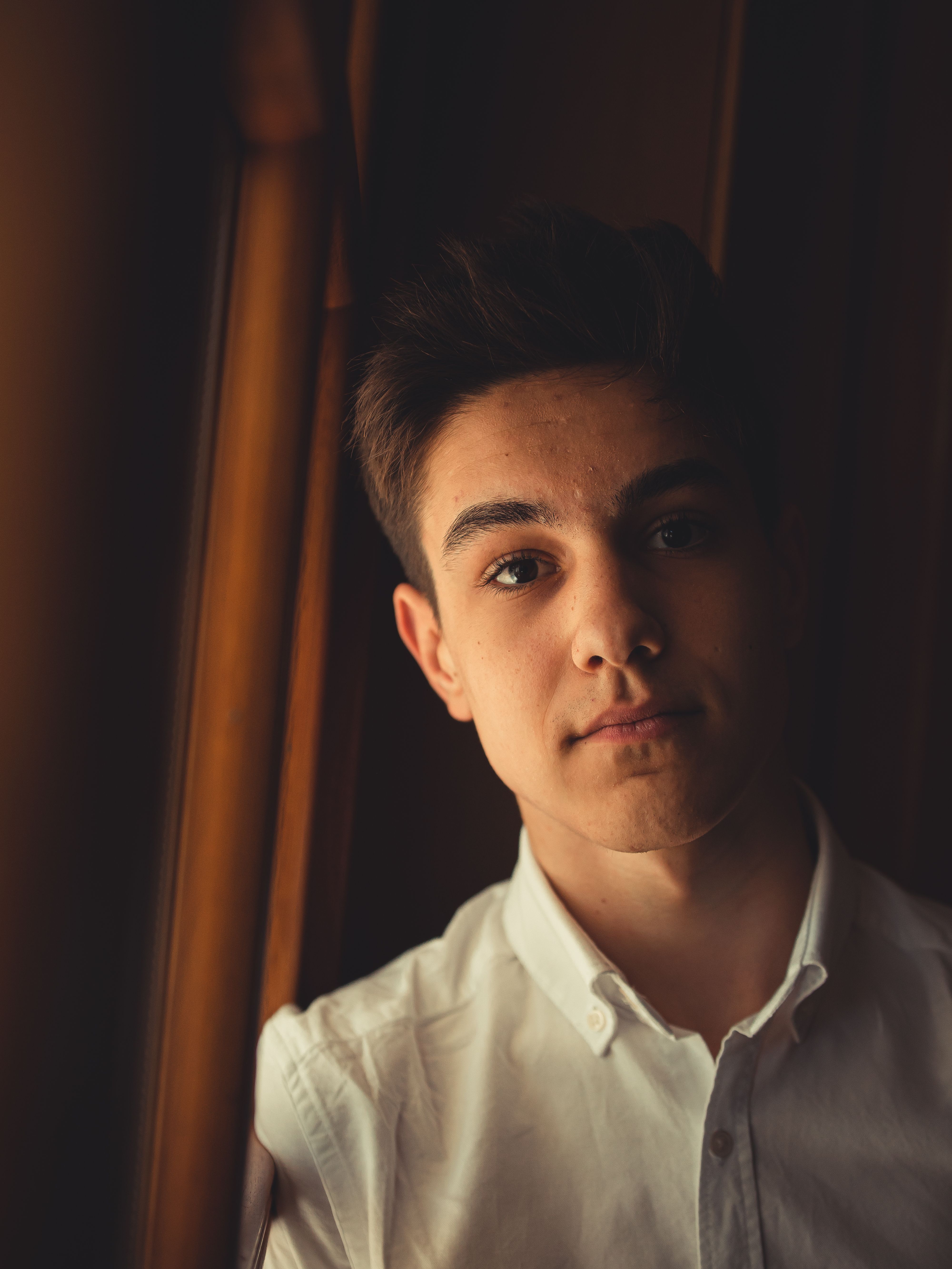 Low-Angle Shot of a Man in White Shirt · Free Stock Photo