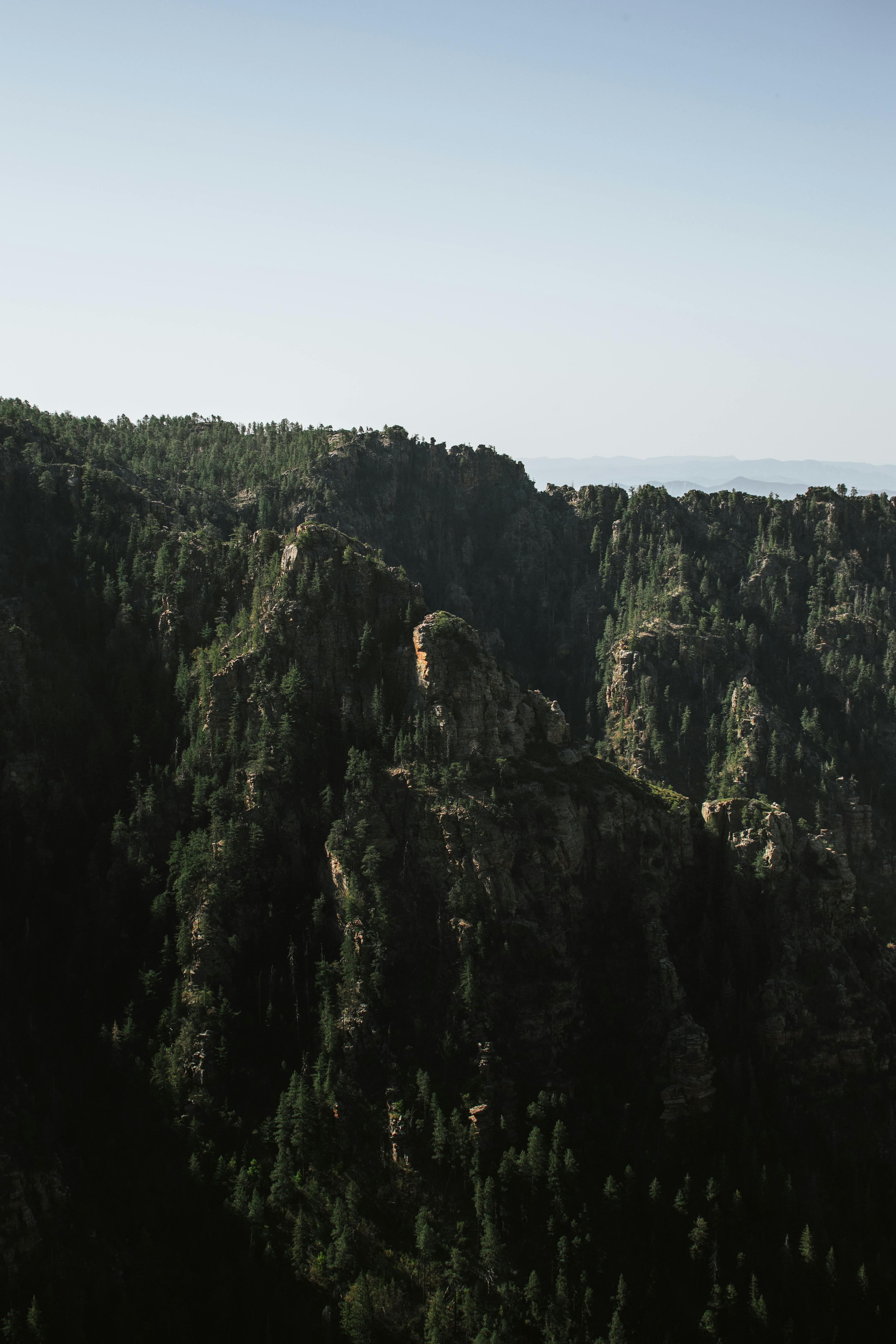 Green Rock Mountains Under Clear Blue Sky · Free Stock Photo