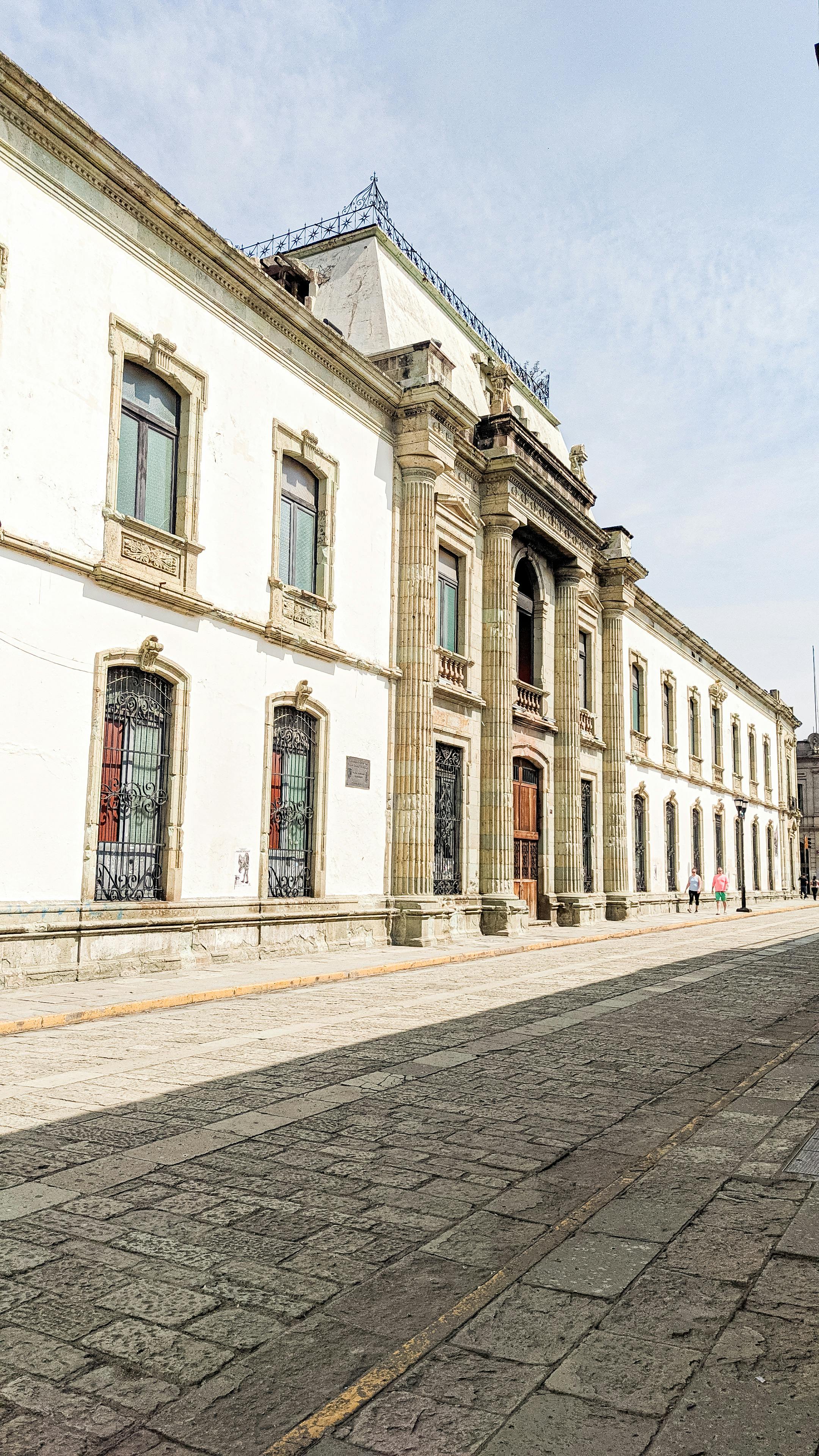 White Odl Concrete Building Under Blue Sky · Free Stock Photo