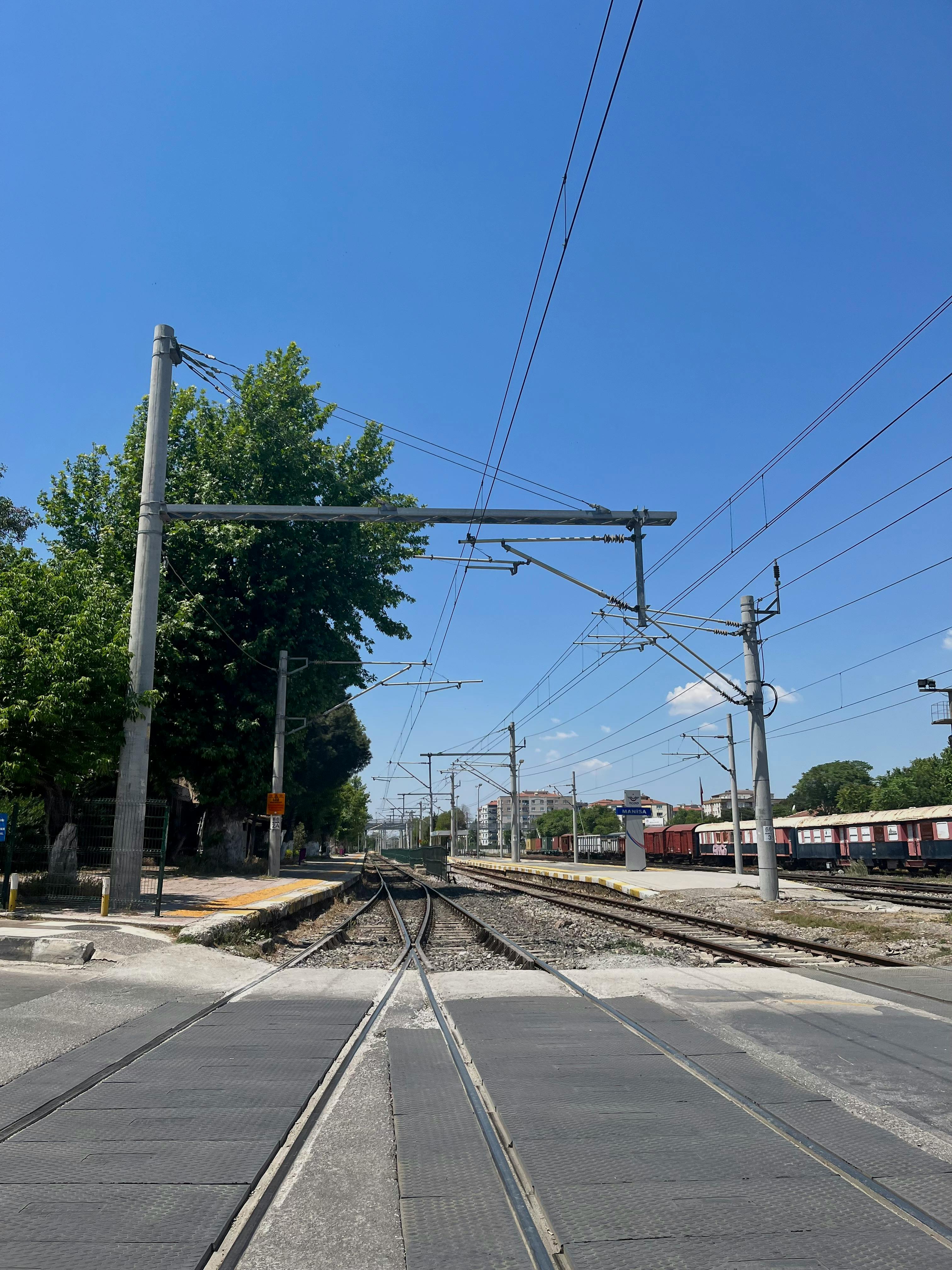 Railroad under Clear Blue Sky · Free Stock Photo