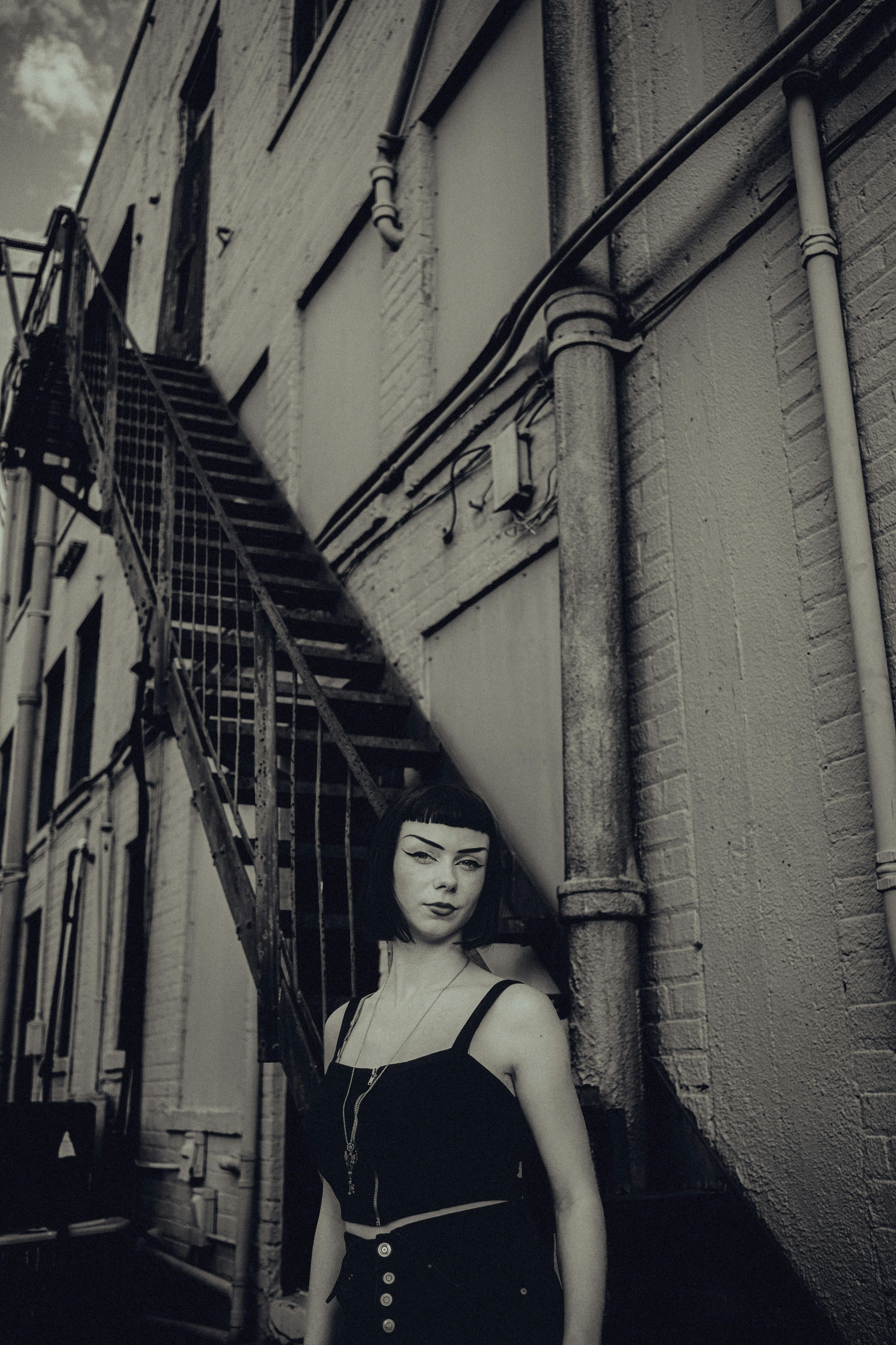 Woman Portrait by Stairs · Free Stock Photo
