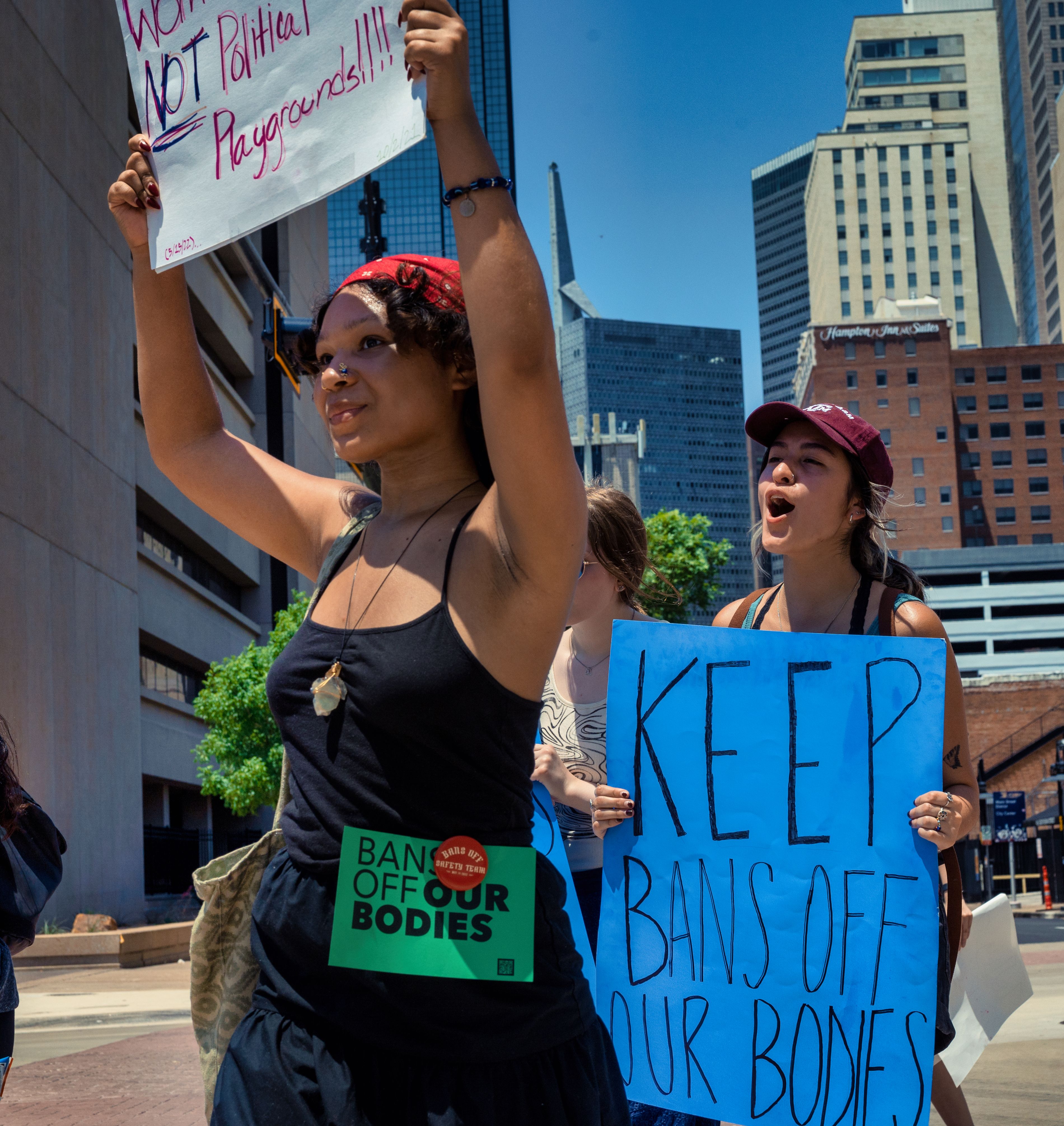Female Activists holding Placards · Free Stock Photo