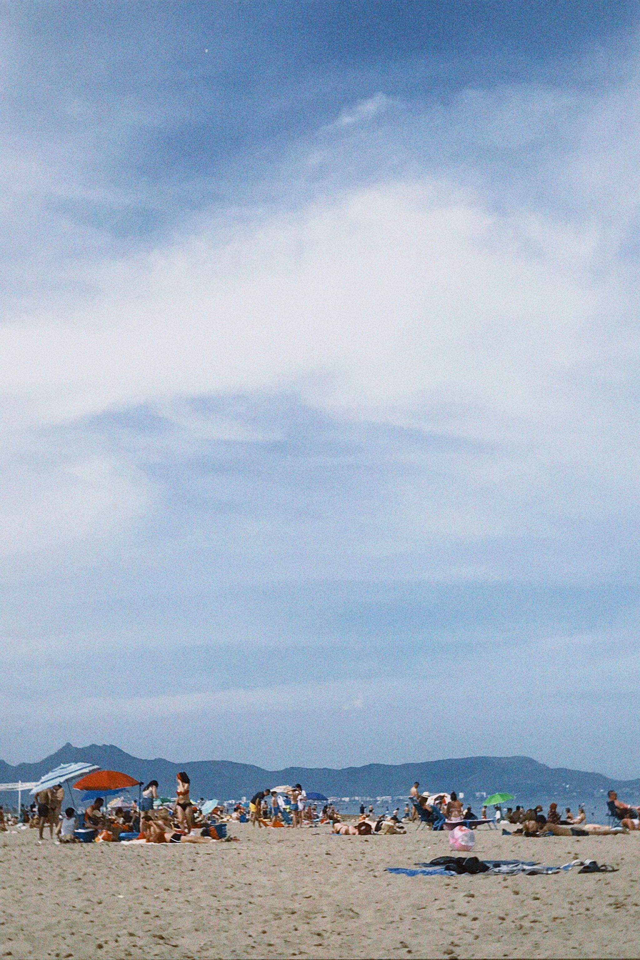People Having Vacation on the Beach · Free Stock Photo