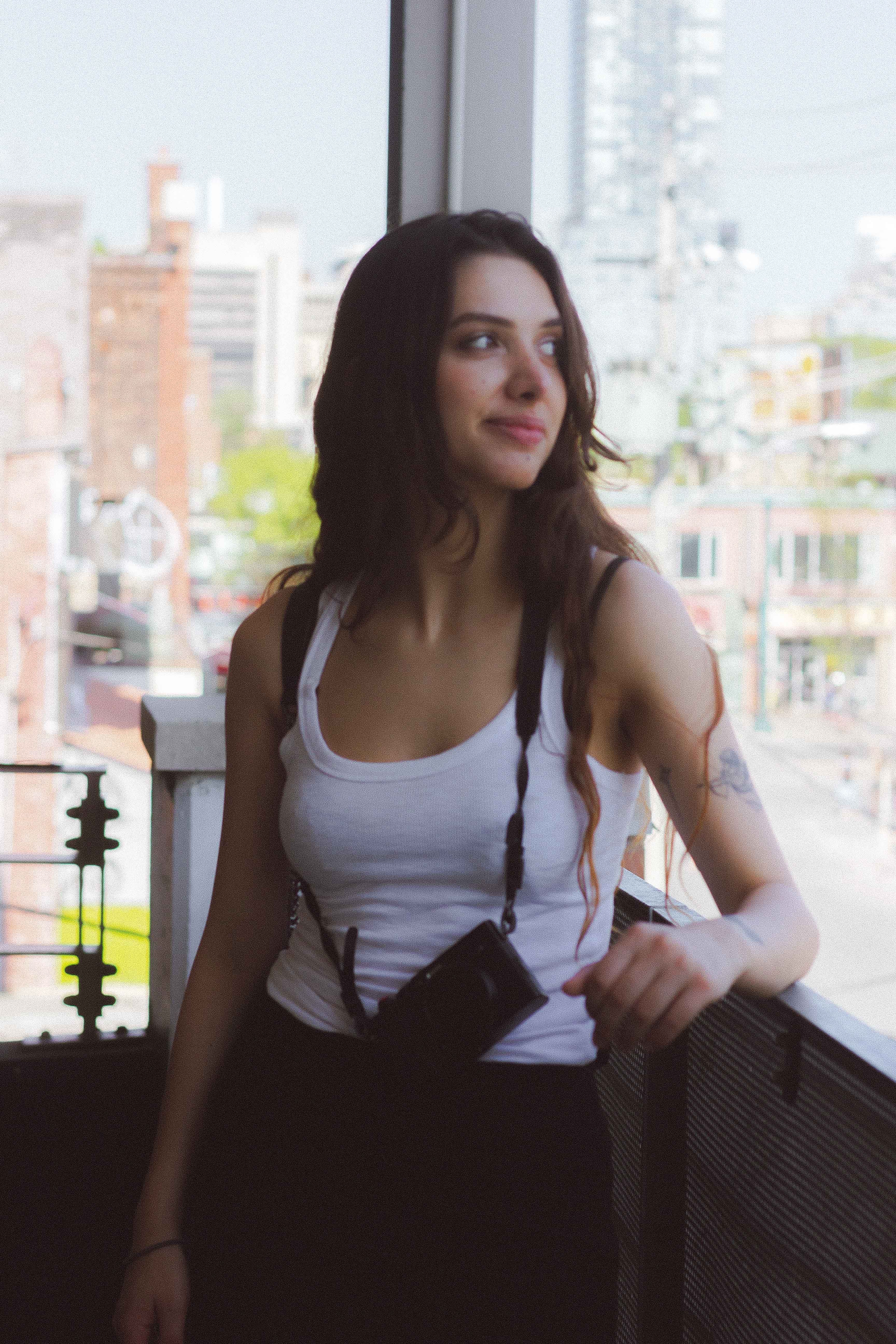 Beautiful Woman in White Tank Top · Free Stock Photo