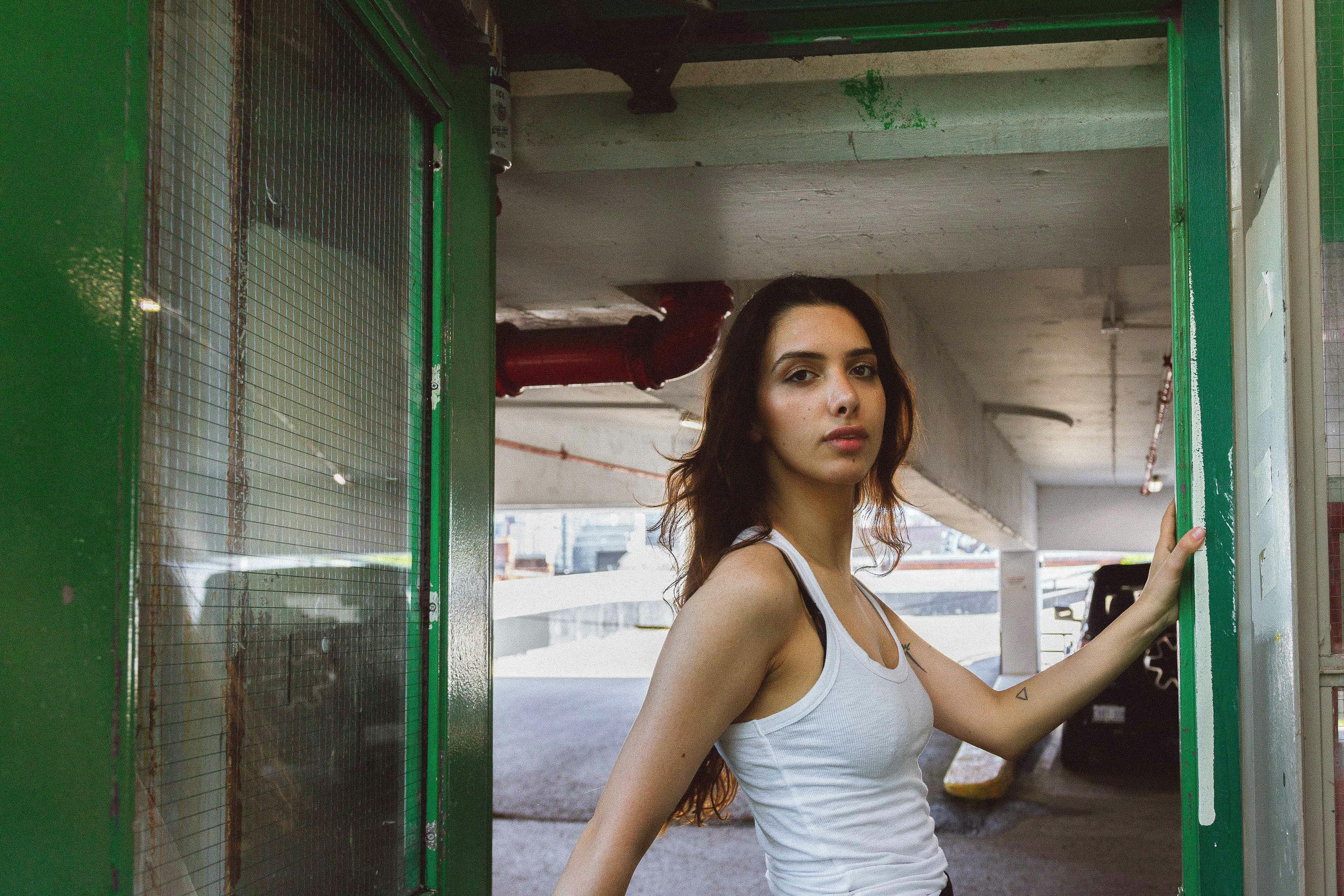 Beautiful Woman in White Tank Top · Free Stock Photo