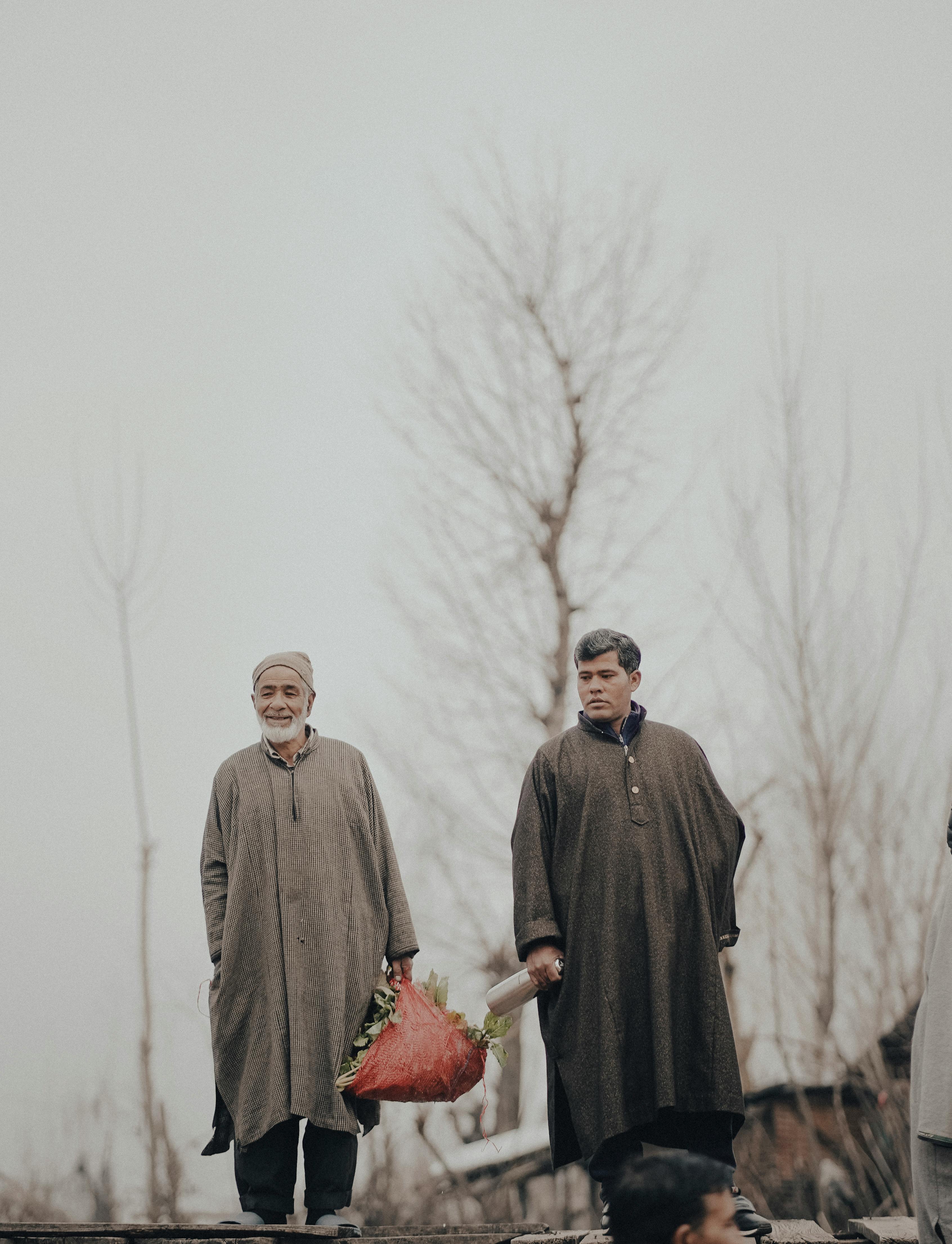 Elderly Men Walking Together · Free Stock Photo