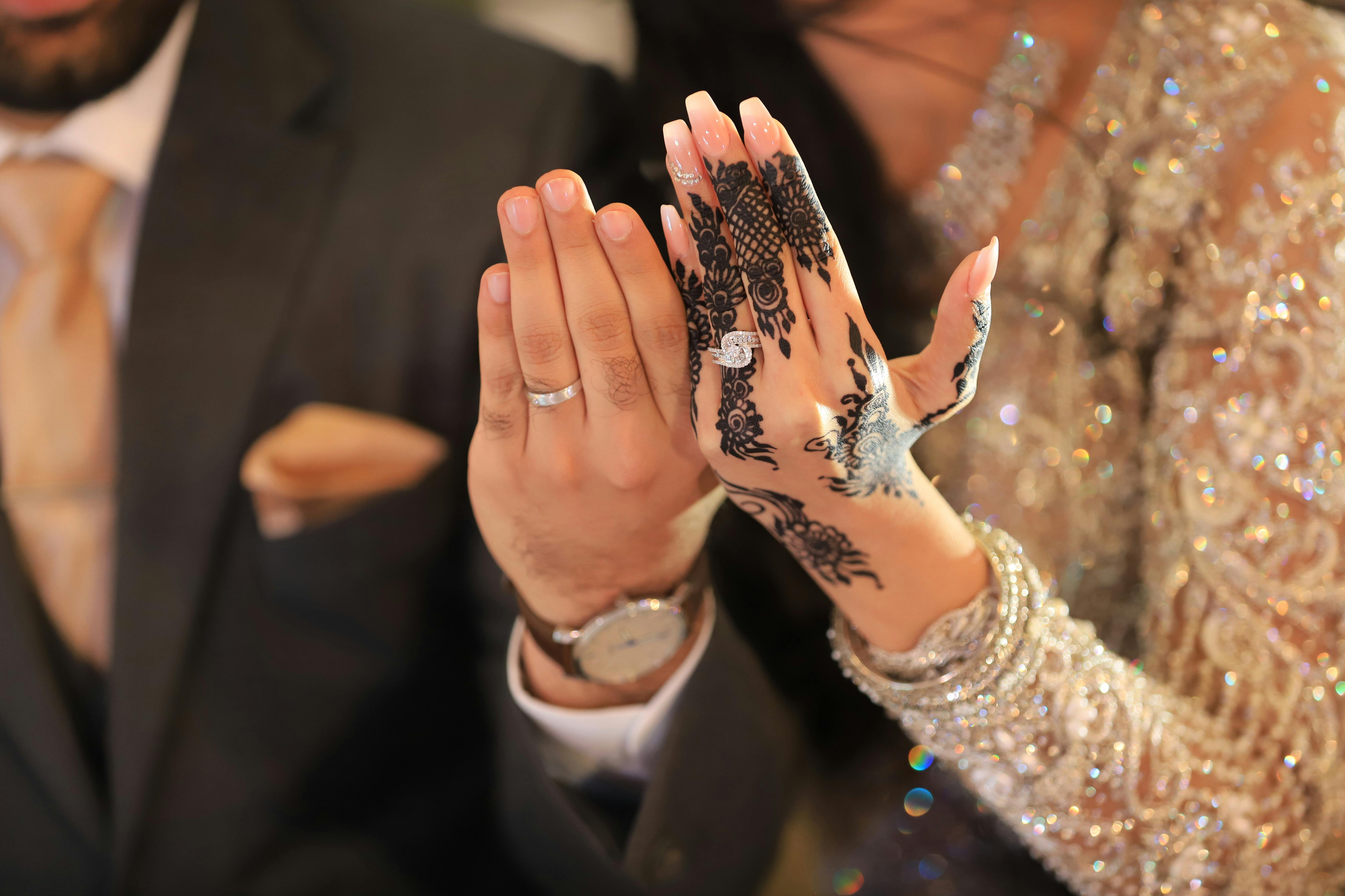 Close-Up Shot of a Wedding Couple Showing Their Wedding Rings · Free ...