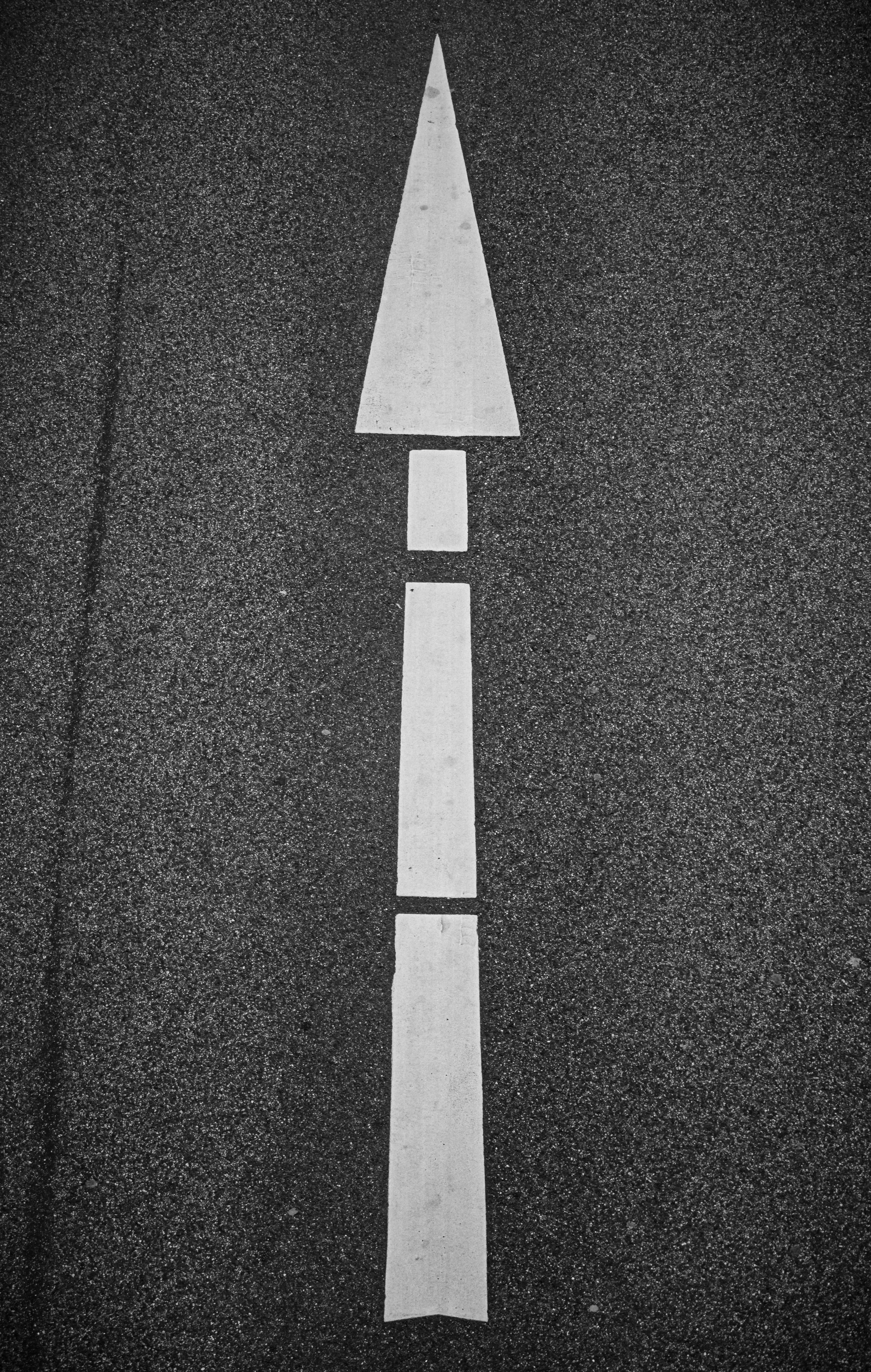 Low Light Photography of White Arrow · Free Stock Photo