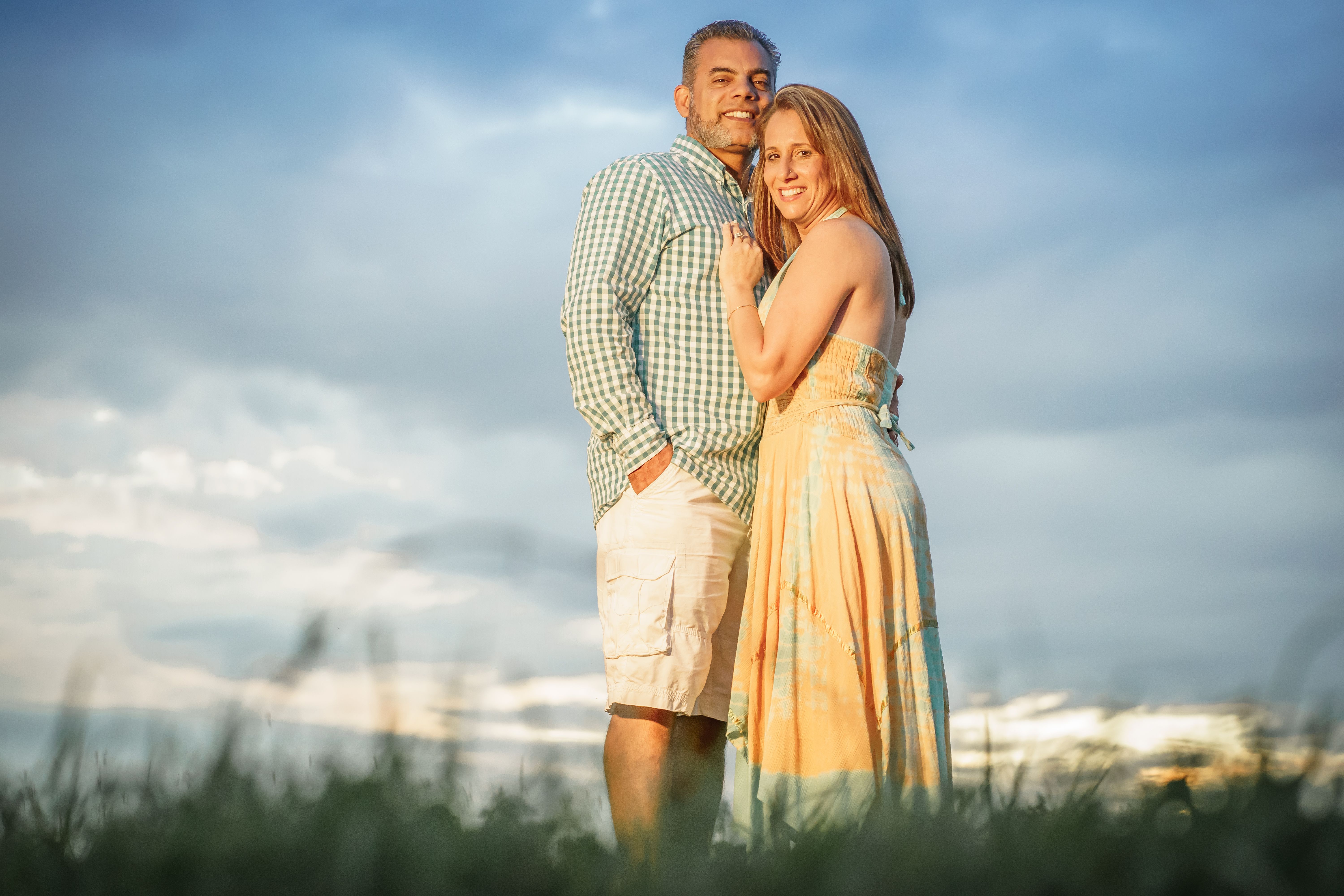 A Couple Standing Together Under the Blue Sky and White Clouds · Free ...