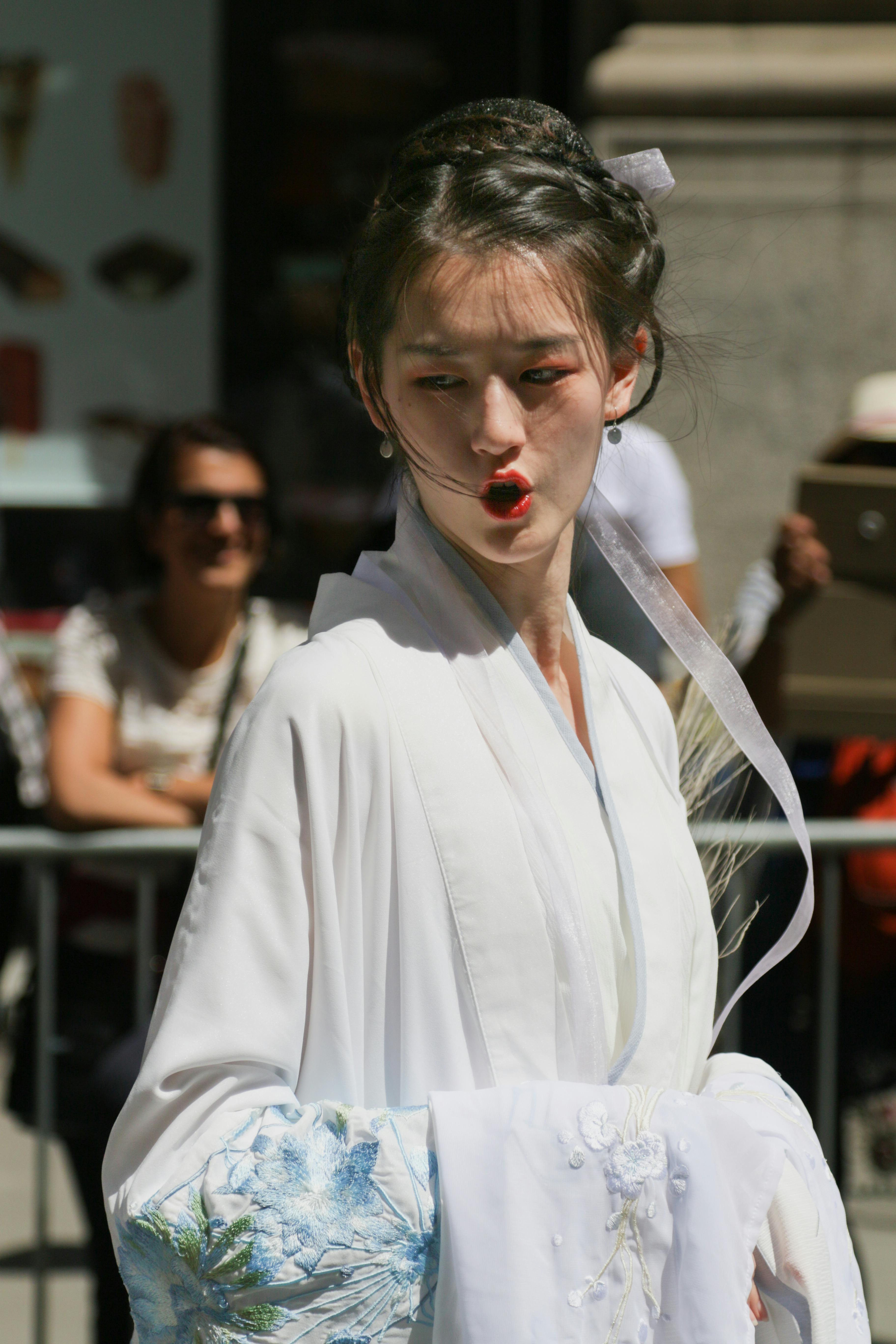 A Woman Wearing Hanfu Gown Standing Near Cherry Blossom Tree · Free ...