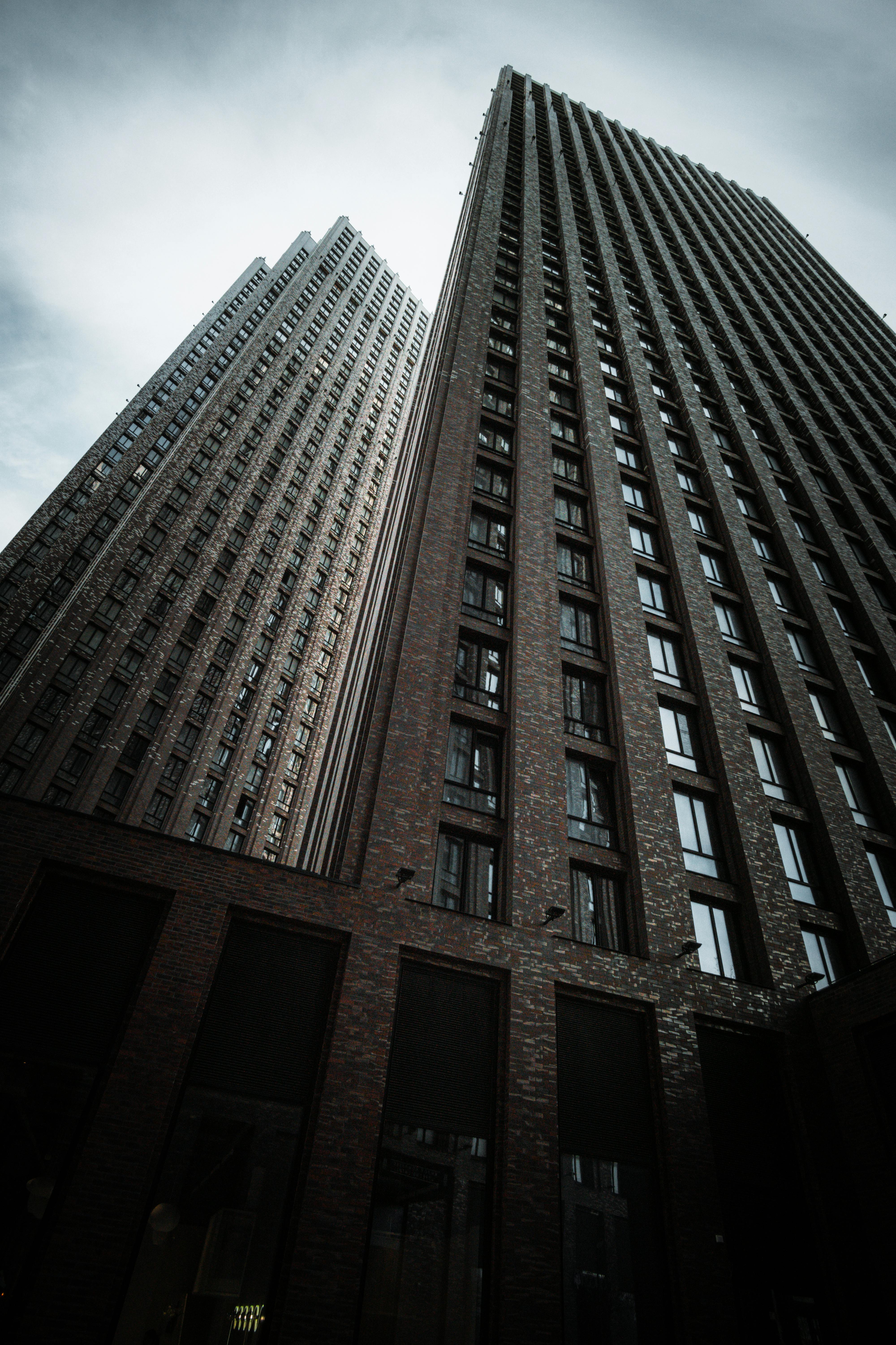 Low-Angle Shot of Two High Rise Buildings in the City · Free Stock Photo