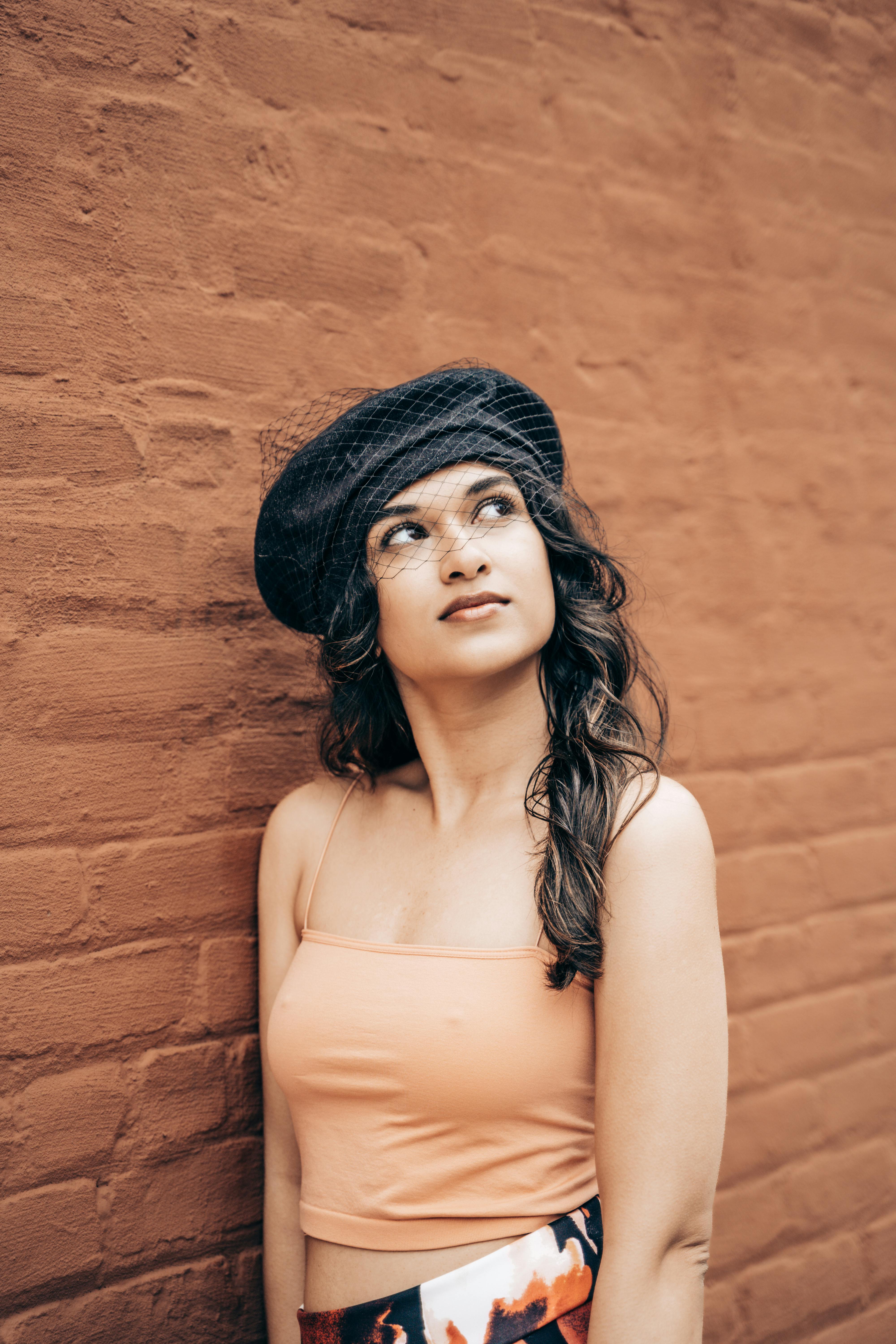 Close-up of a Crouching Woman · Free Stock Photo