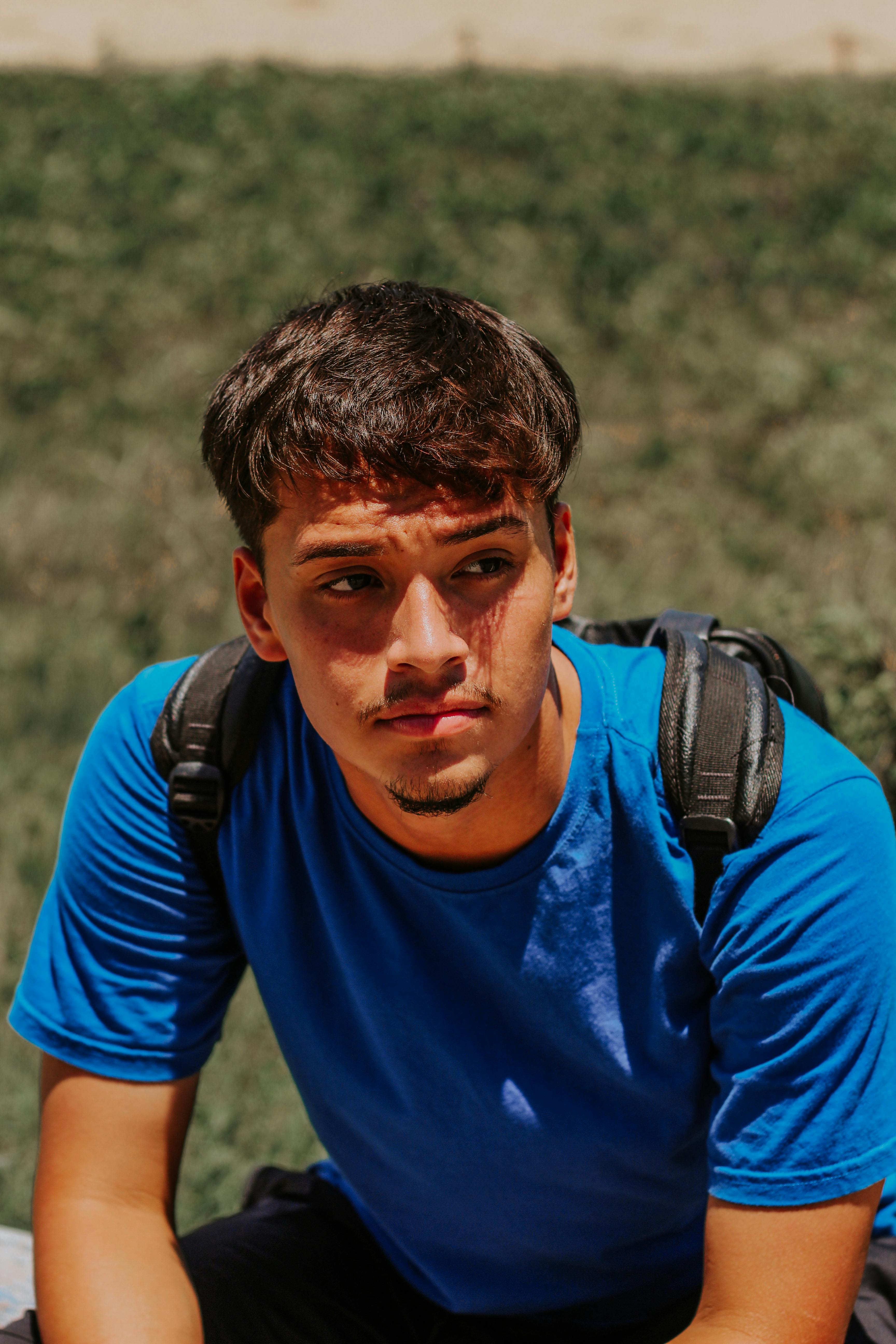 A Man Walking Carrying a Sack · Free Stock Photo