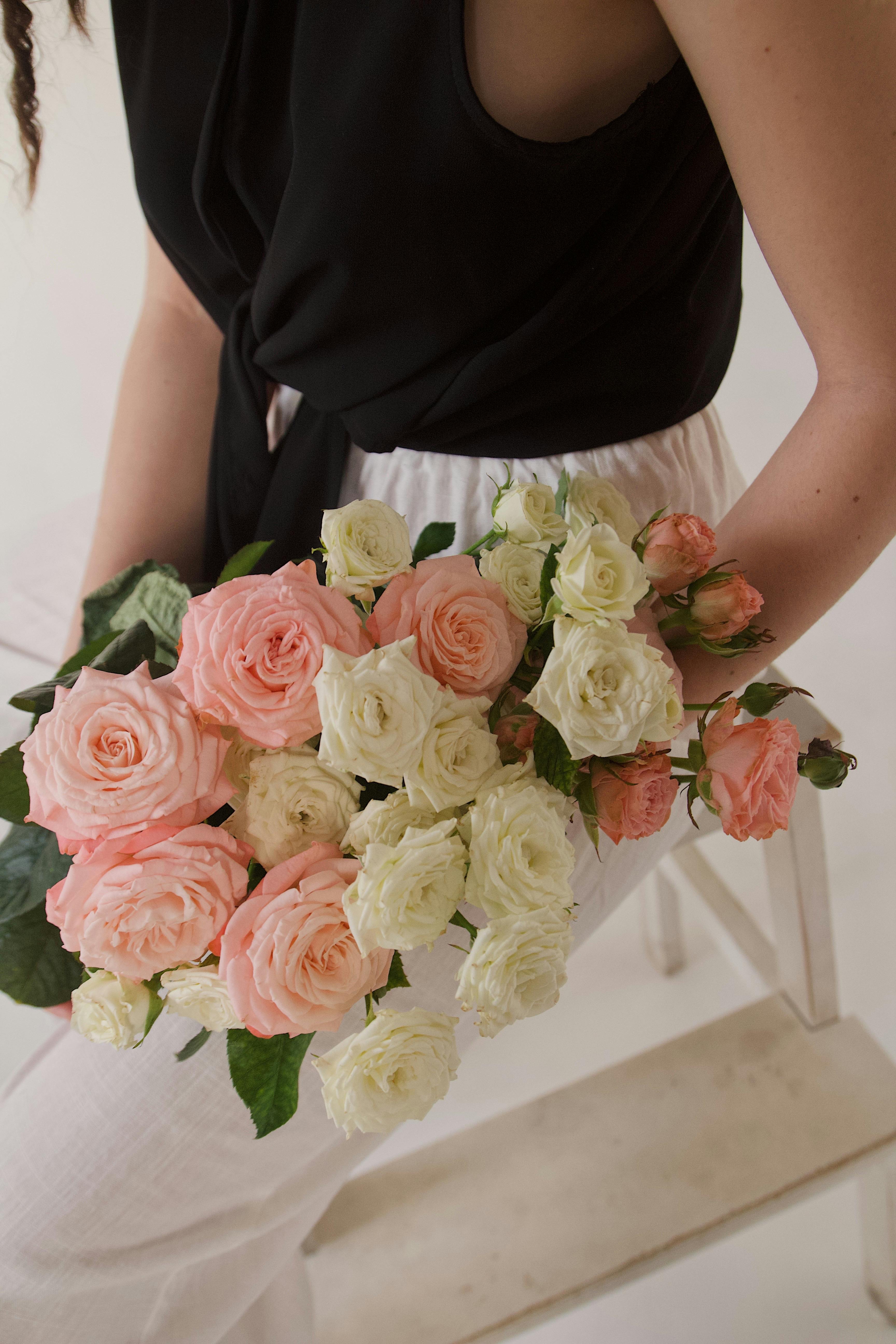 Woman Holding Flower Bouquet · Free Stock Photo