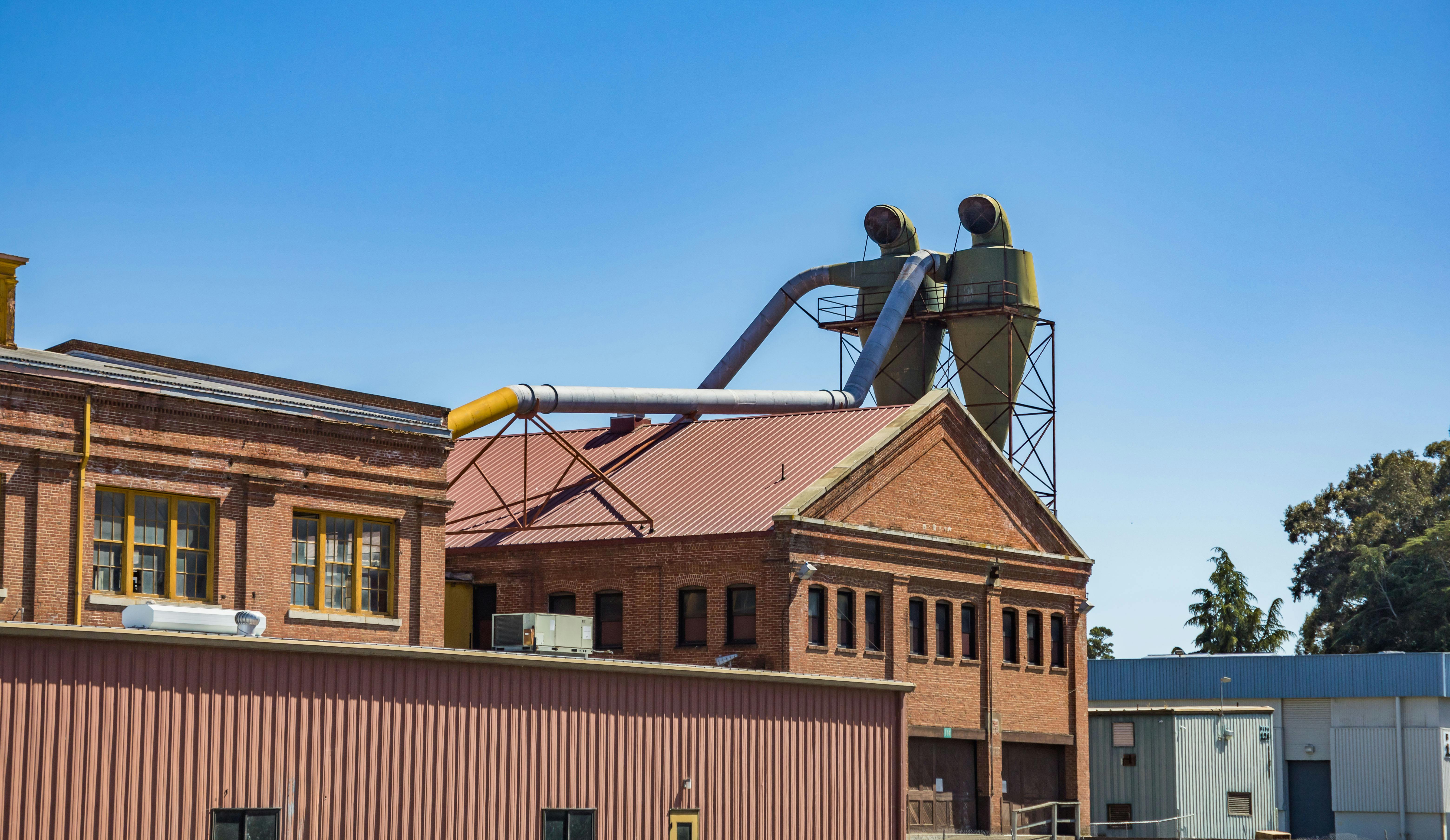 Tube Pipes on the Building Roof · Free Stock Photo