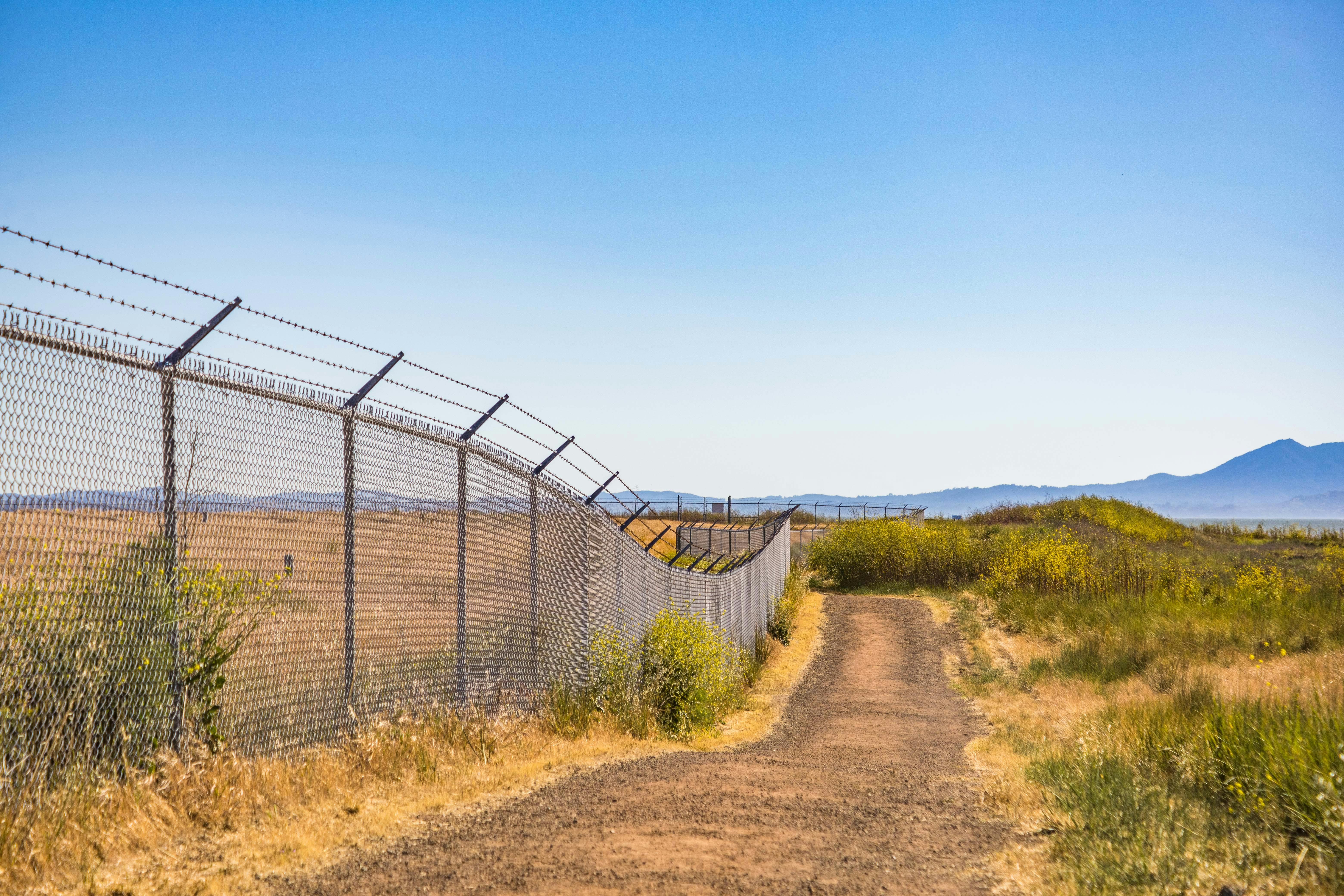 Road Along Fence on Landscape · Free Stock Photo