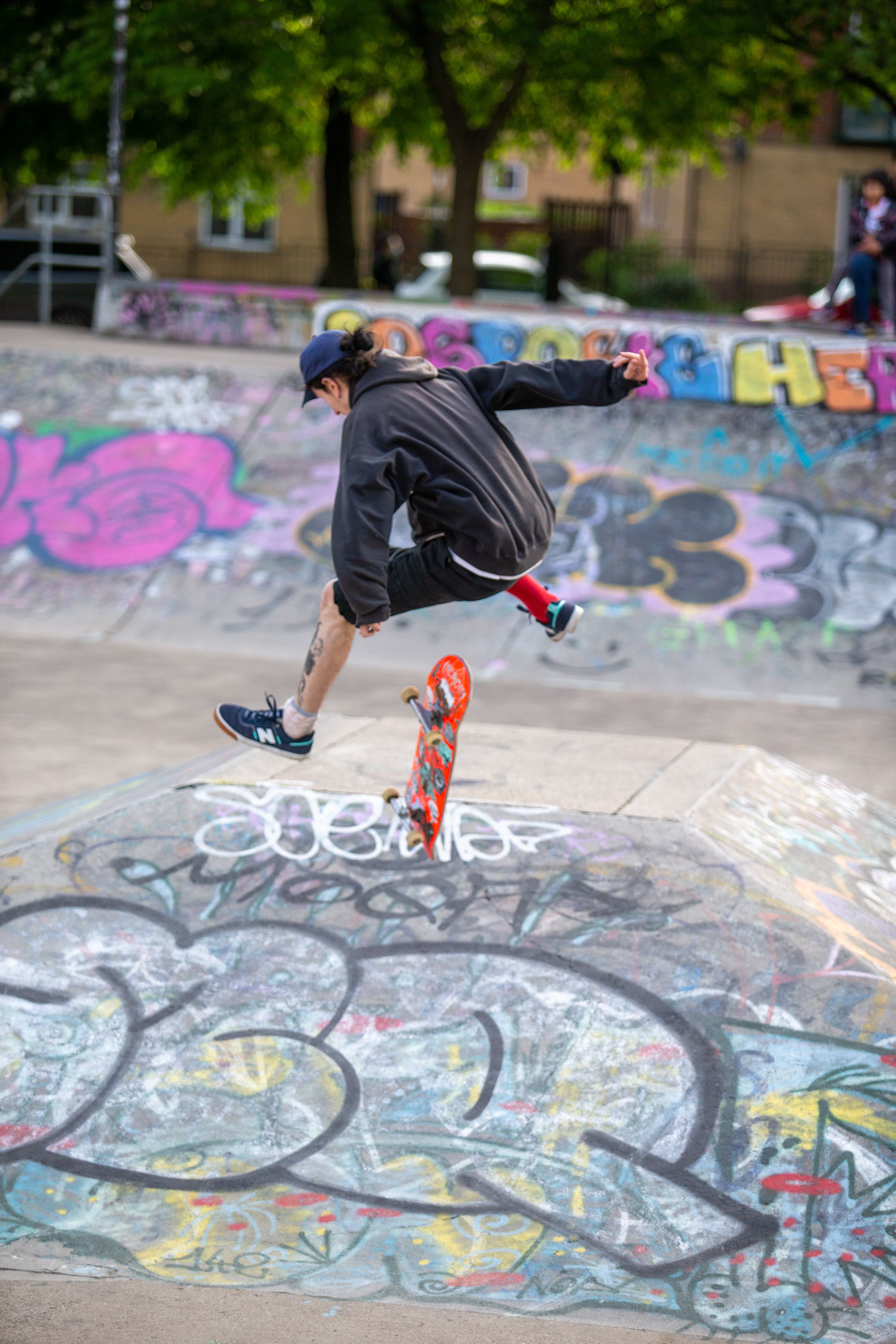 Shirtless Man Doing Tricks on a Skateboard in a Skatepark · Free Stock ...