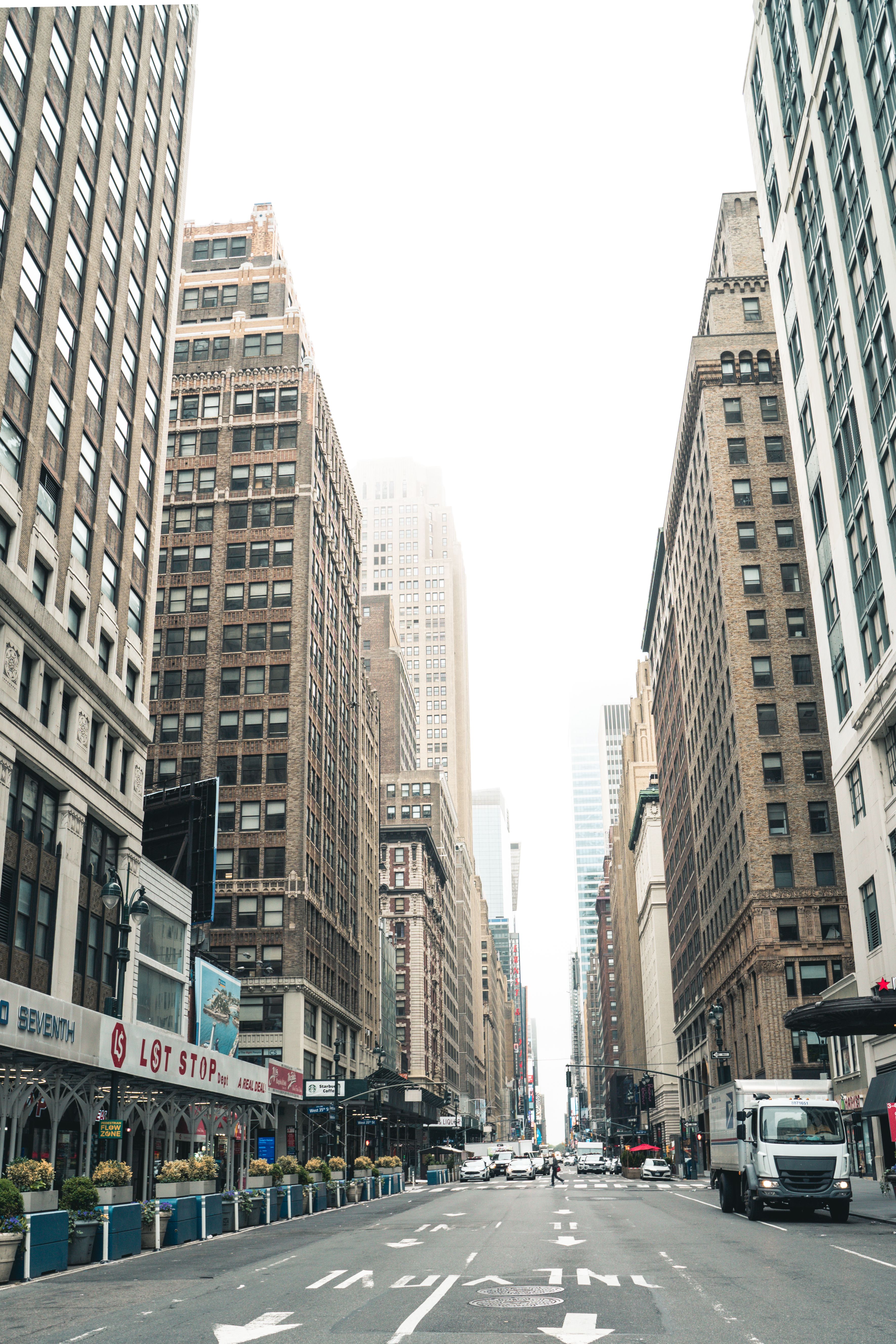 Buildings and Skyscraper near Street · Free Stock Photo