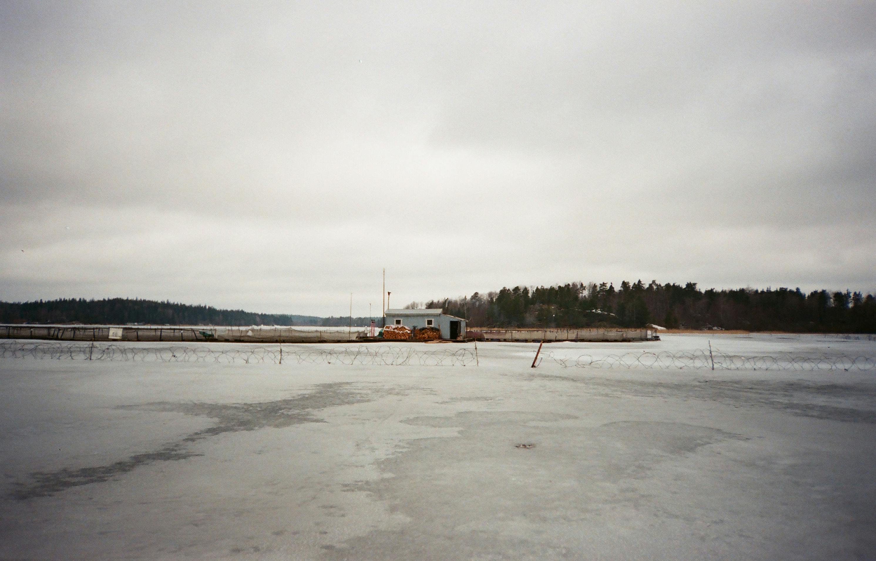 Shed at the Center of Dried Up Body of Water · Free Stock Photo