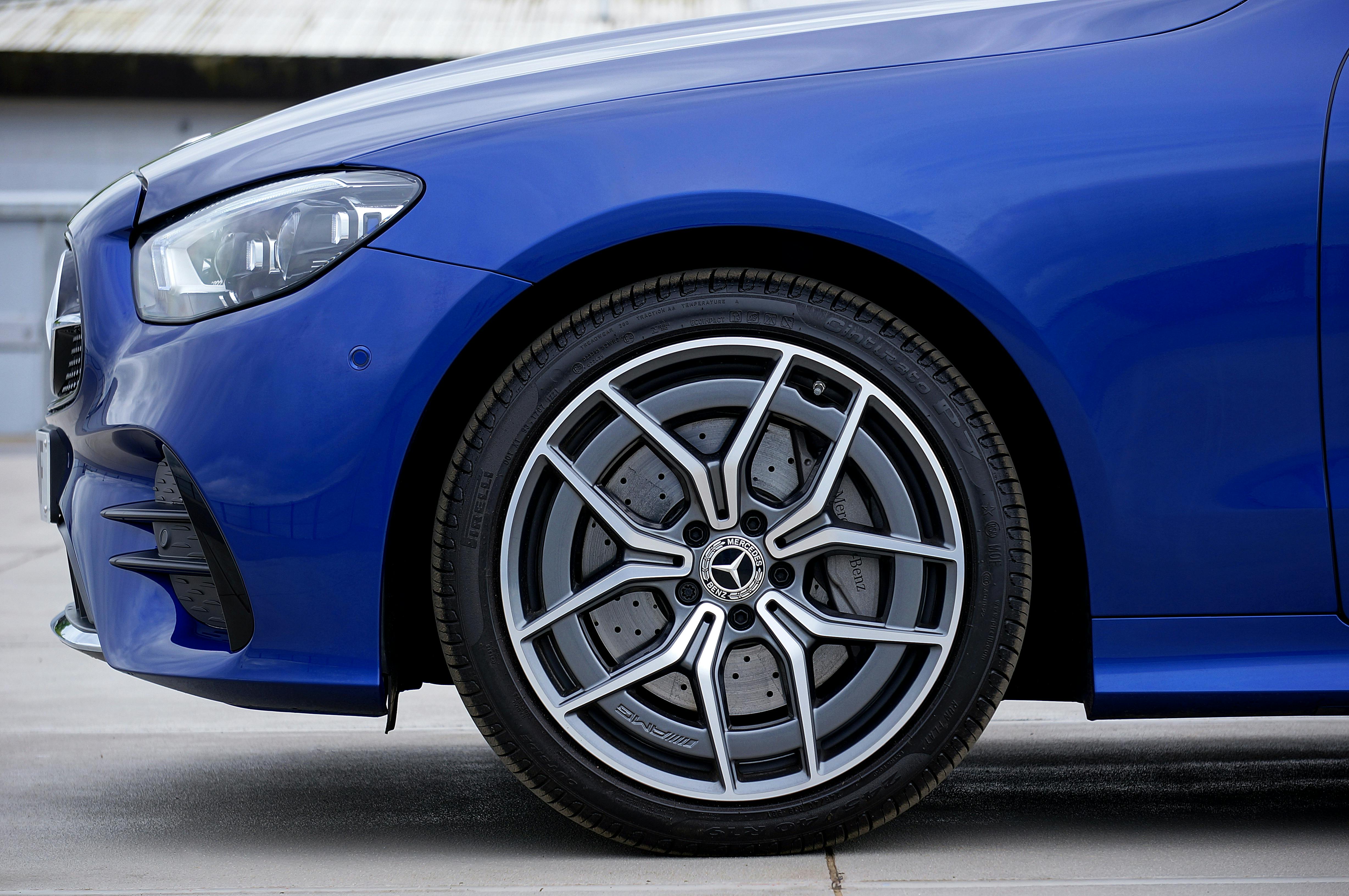 Close-up of the Wheel of a Blue Car · Free Stock Photo