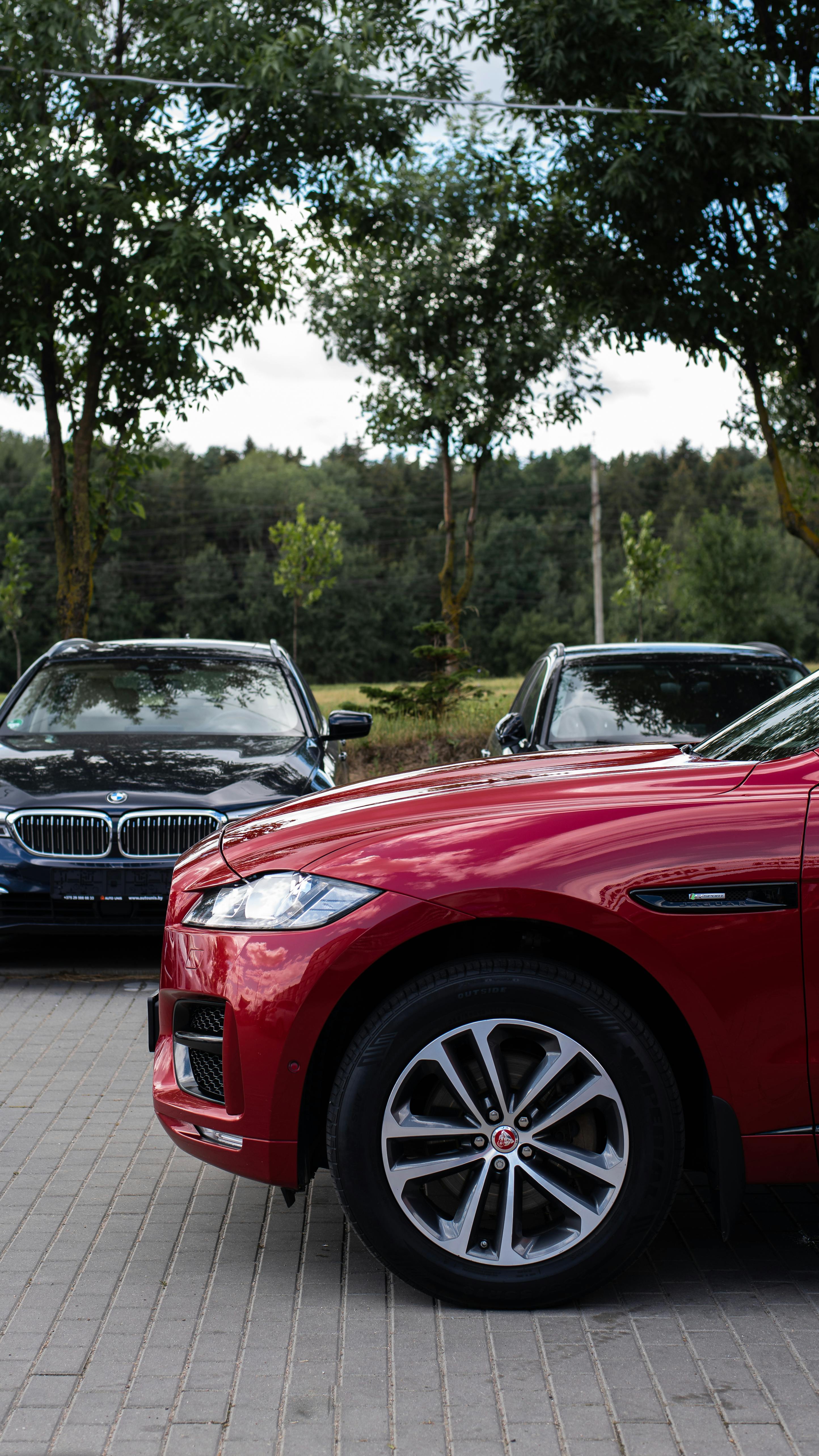 Side View of a Red Luxury Car · Free Stock Photo