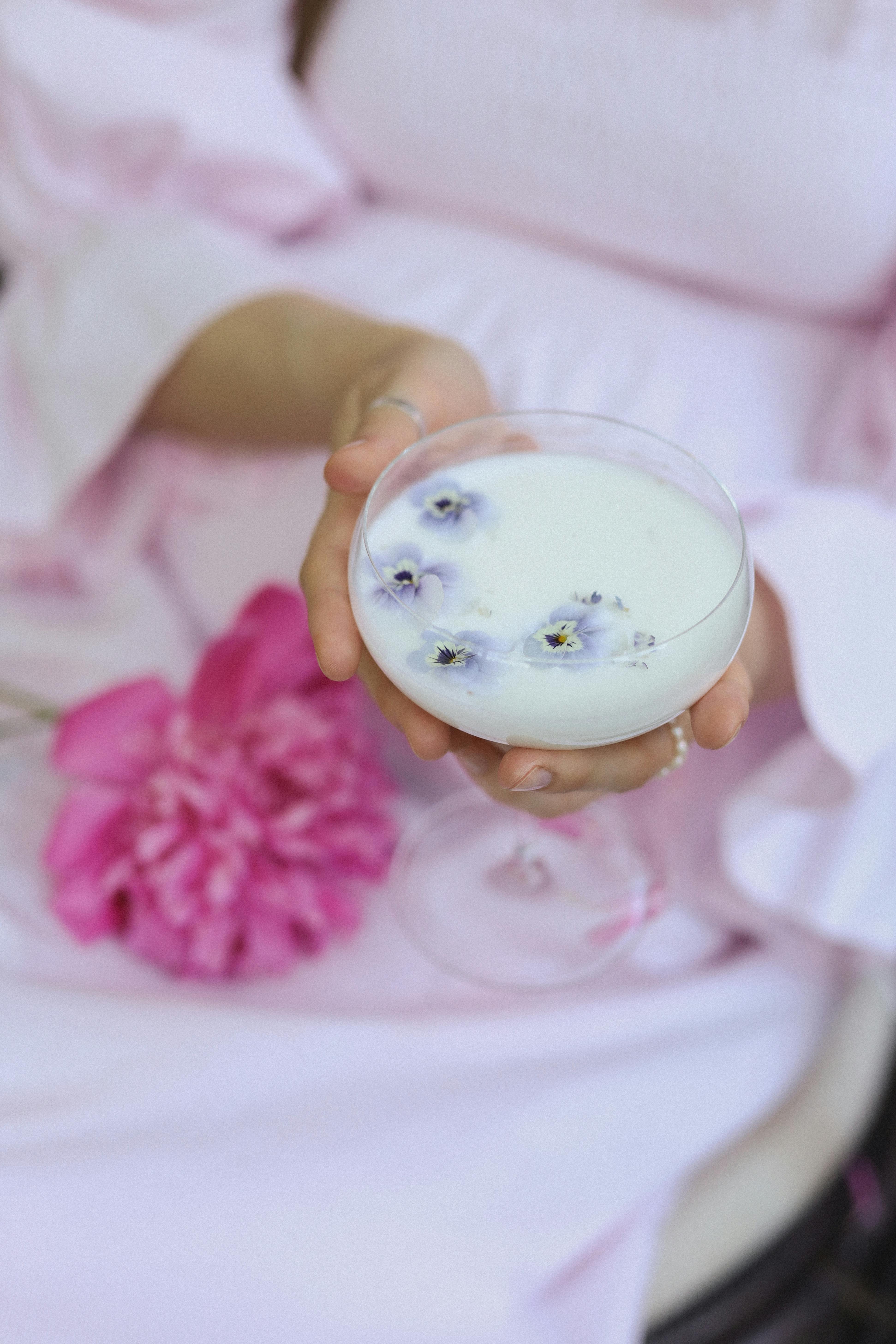 Hand Holding Glass with Liquid · Free Stock Photo